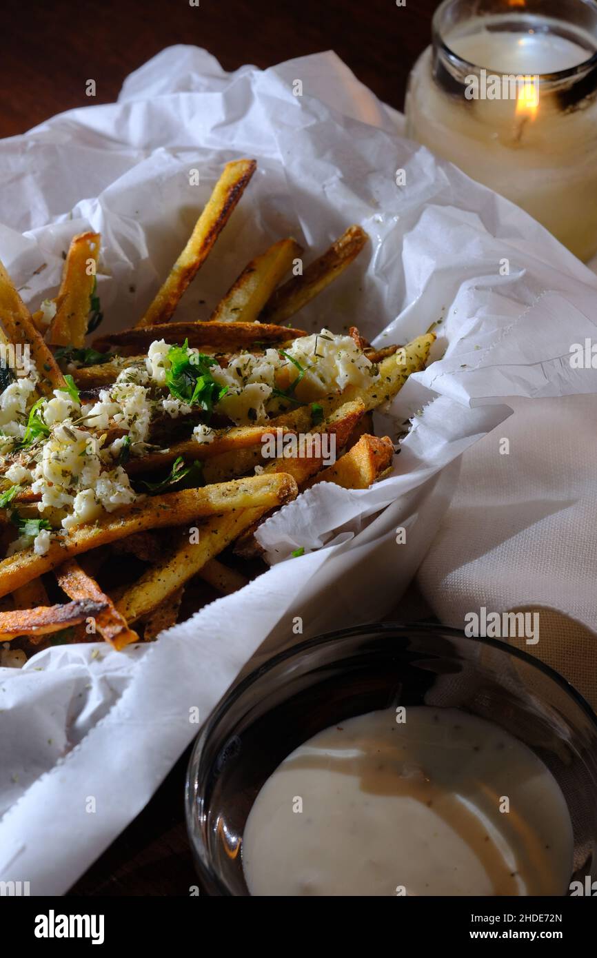 Delicious Mediterranean street cart fried potatoes with feta cheese ...