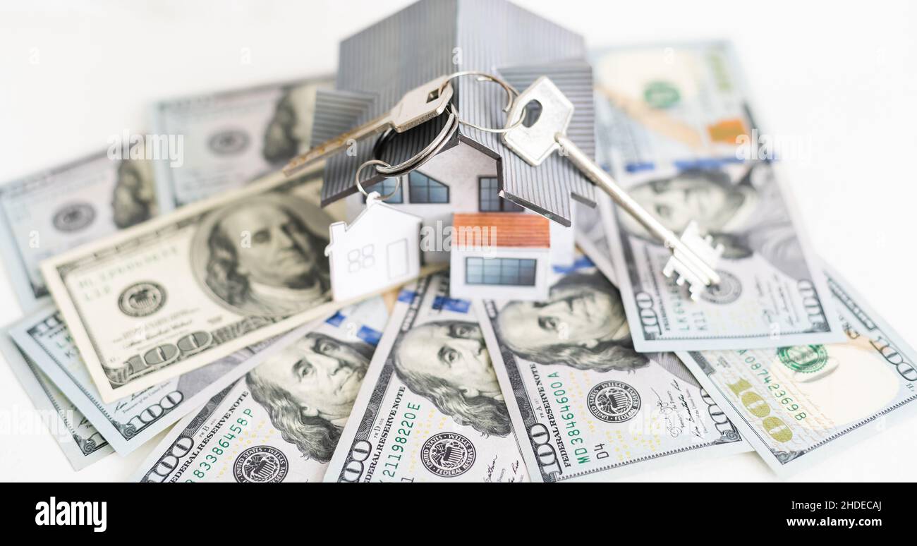 house layout and dollar bills on the background Stock Photo - Alamy