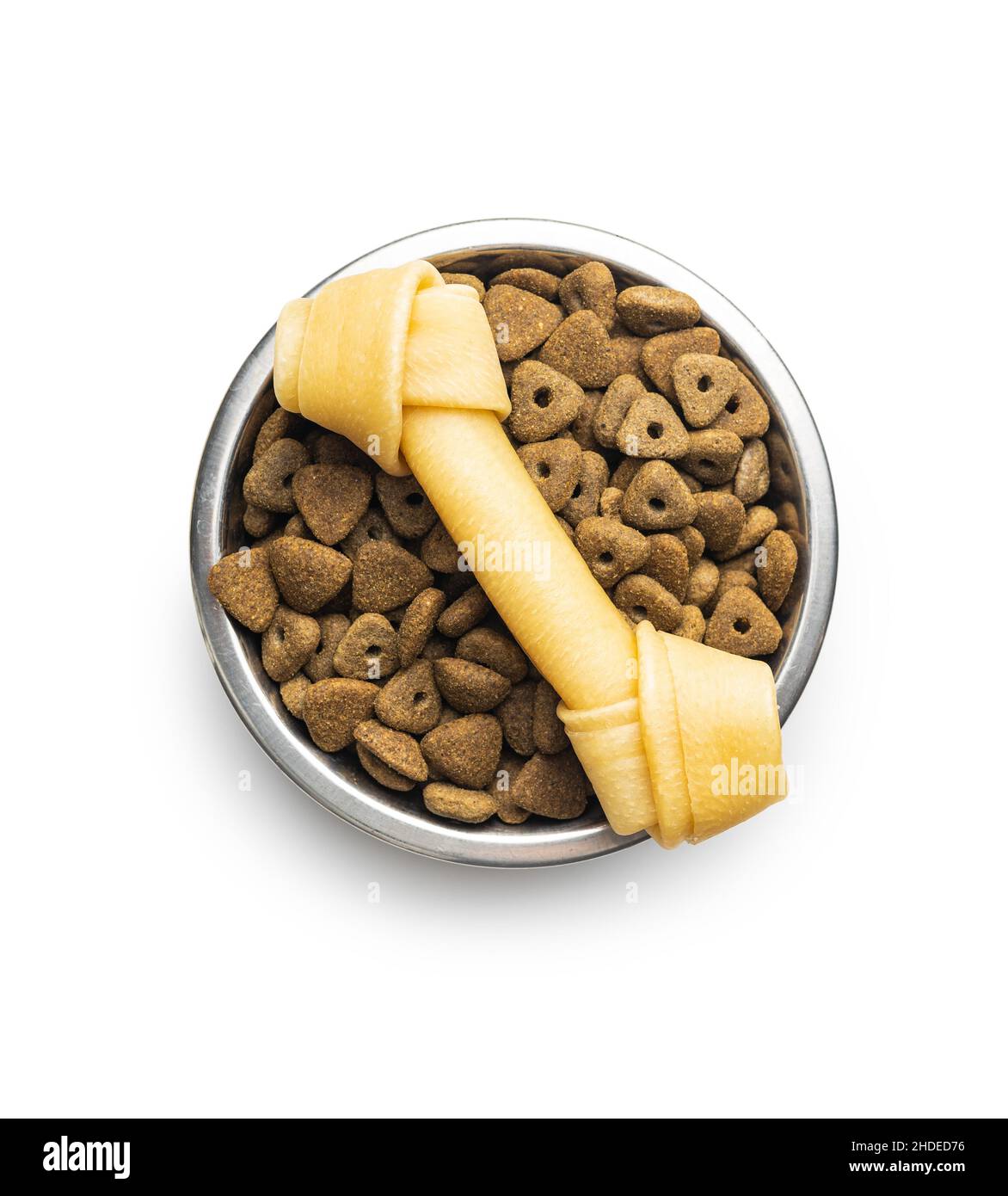 Delicacy for dogs. Chewing bone and dried food for dog isolated on ...