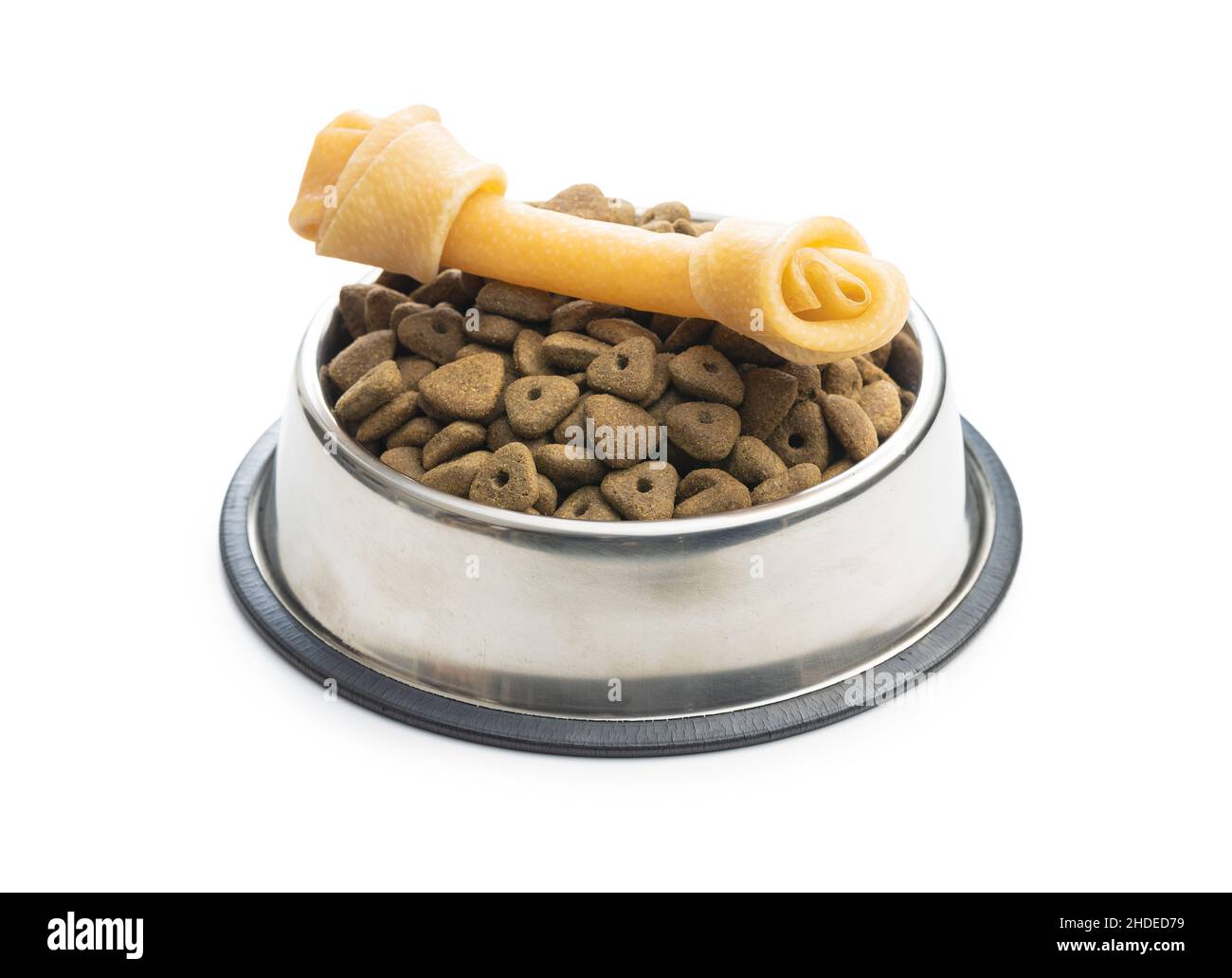 Delicacy for dogs. Chewing bone and dried food for dog isolated on ...