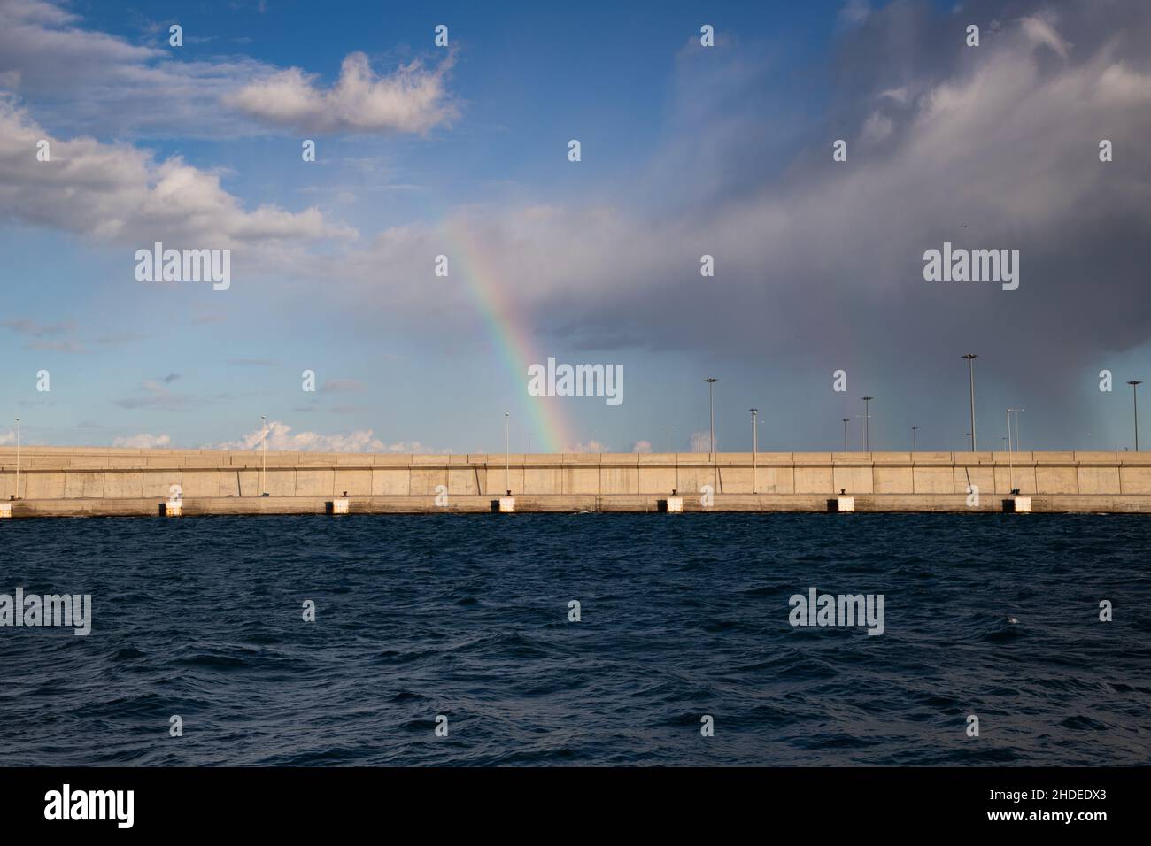 rainbow over the sea sky clearing after storm Stock Photo - Alamy