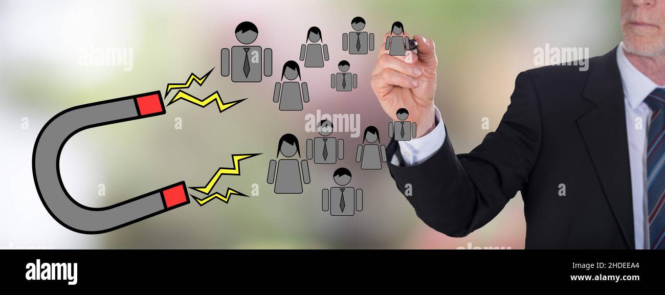 Businessman drawing a customer attraction concept Stock Photo - Alamy