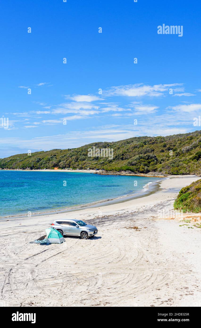 A 4WD vehicle on the soft sand of Cosy Corner Beach, overlooking ...