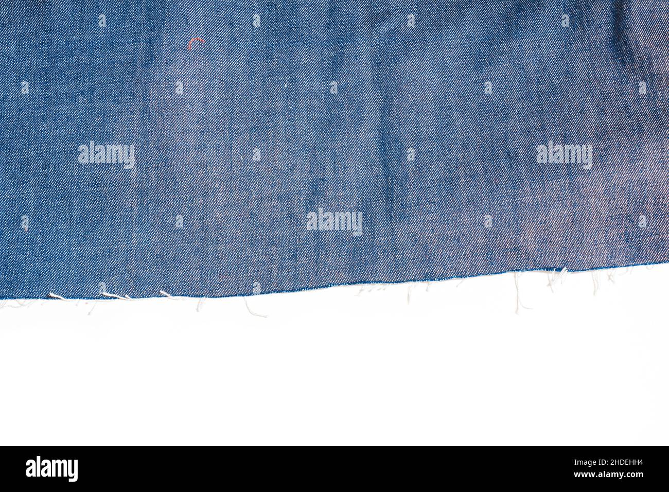 Denim jeans texture. Ripped vintage jeans texture over white background ...