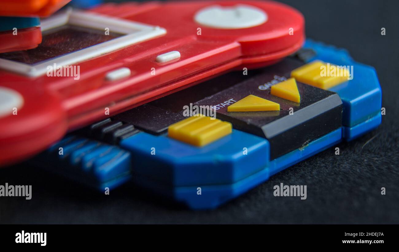Old, retro, vintage handheld video games Stock Photo - Alamy