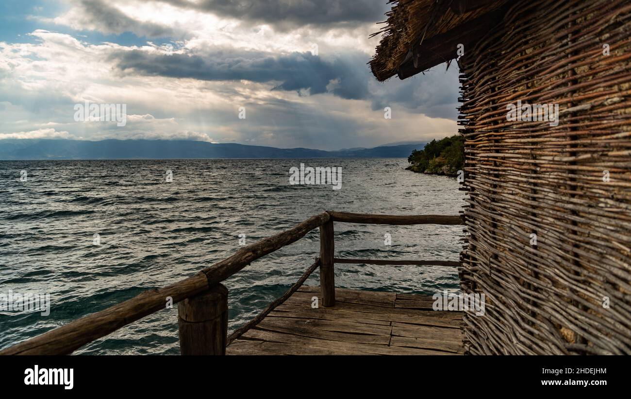 An old medieval house on the lake Stock Photo - Alamy