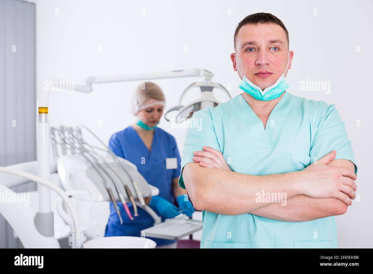 Dentist with arms crossed hi-res stock photography and images - Alamy