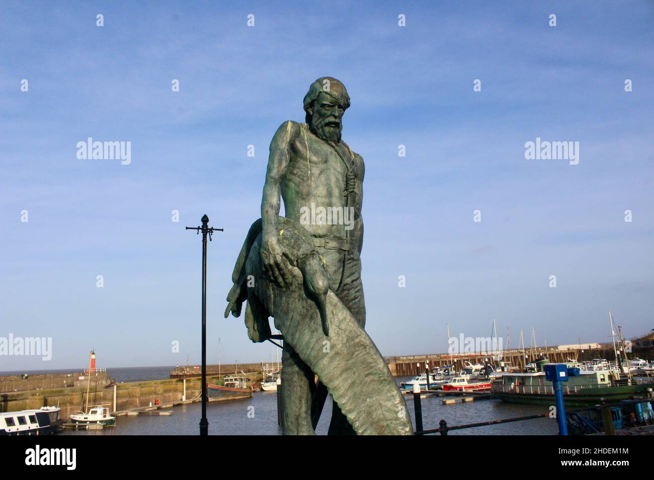 a statue of the ancient mariner on the quay at watchet england somerset ...
