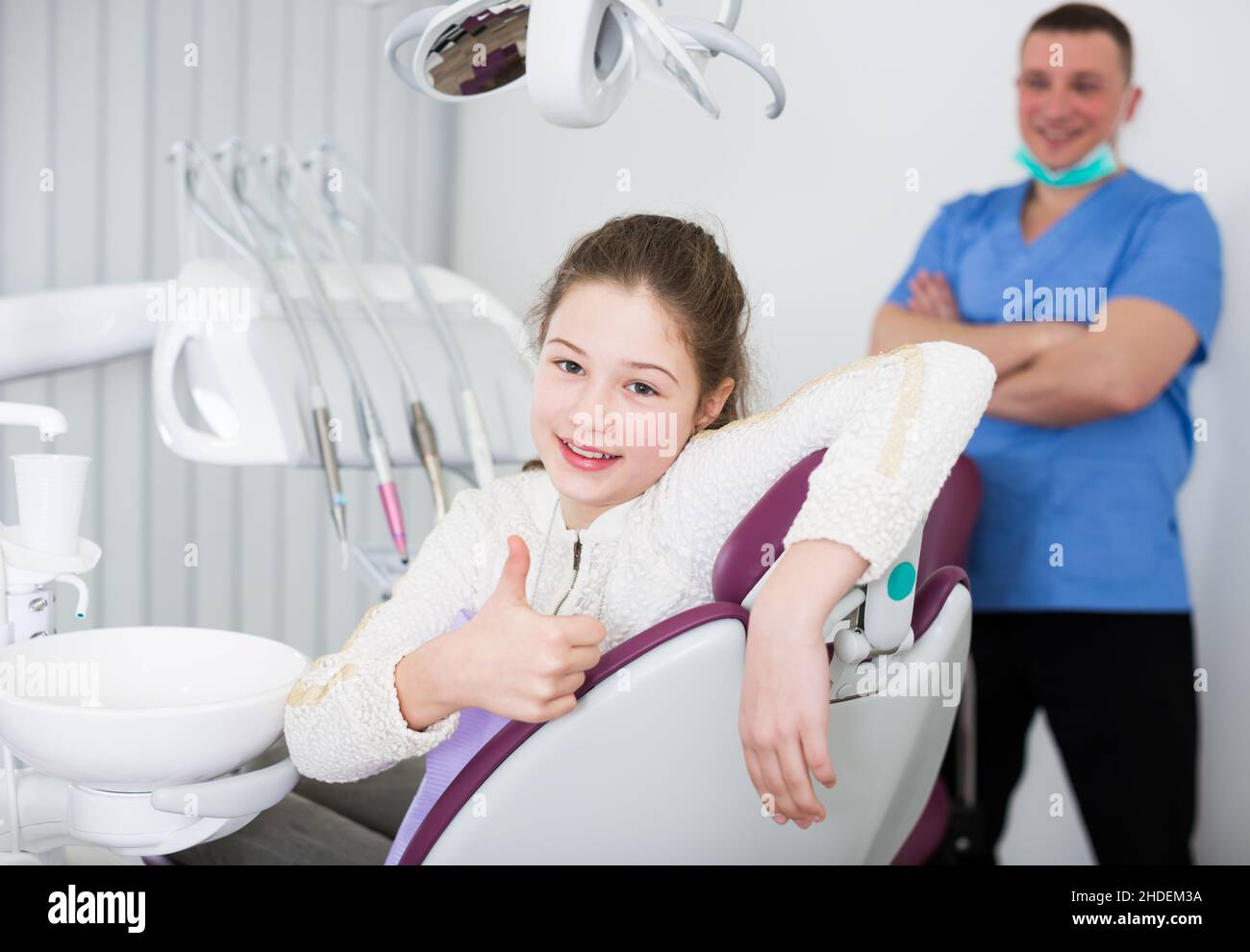 Teen girl showing thumbs hi-res stock photography and images - Alamy