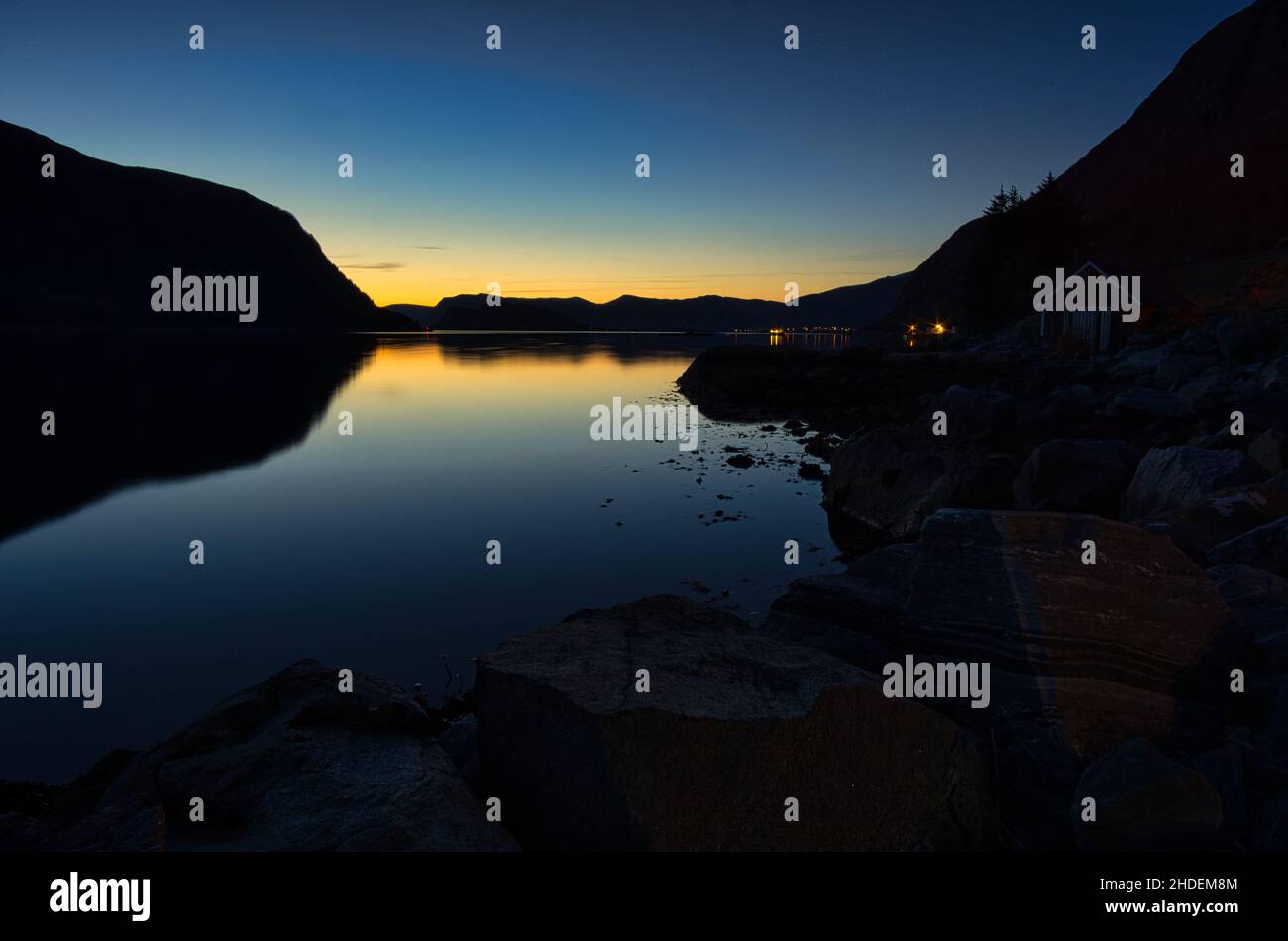 fishing vacation in selje norway. the blue hour on the fjord. calm mood ...