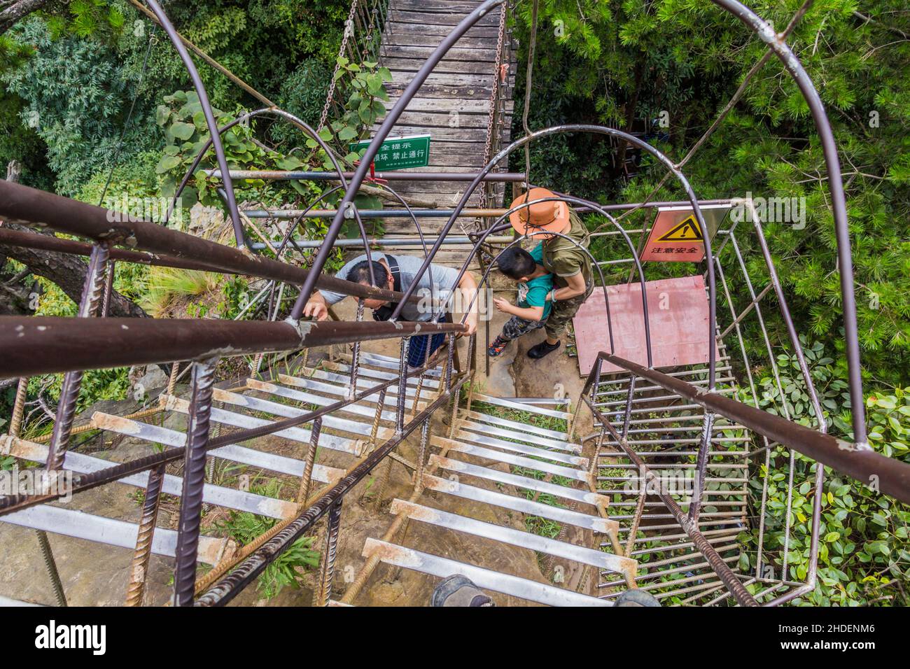 WULINGYUAN, CHINA - AUGUST 9, 2018: Tourists climb a ladder leading to ...