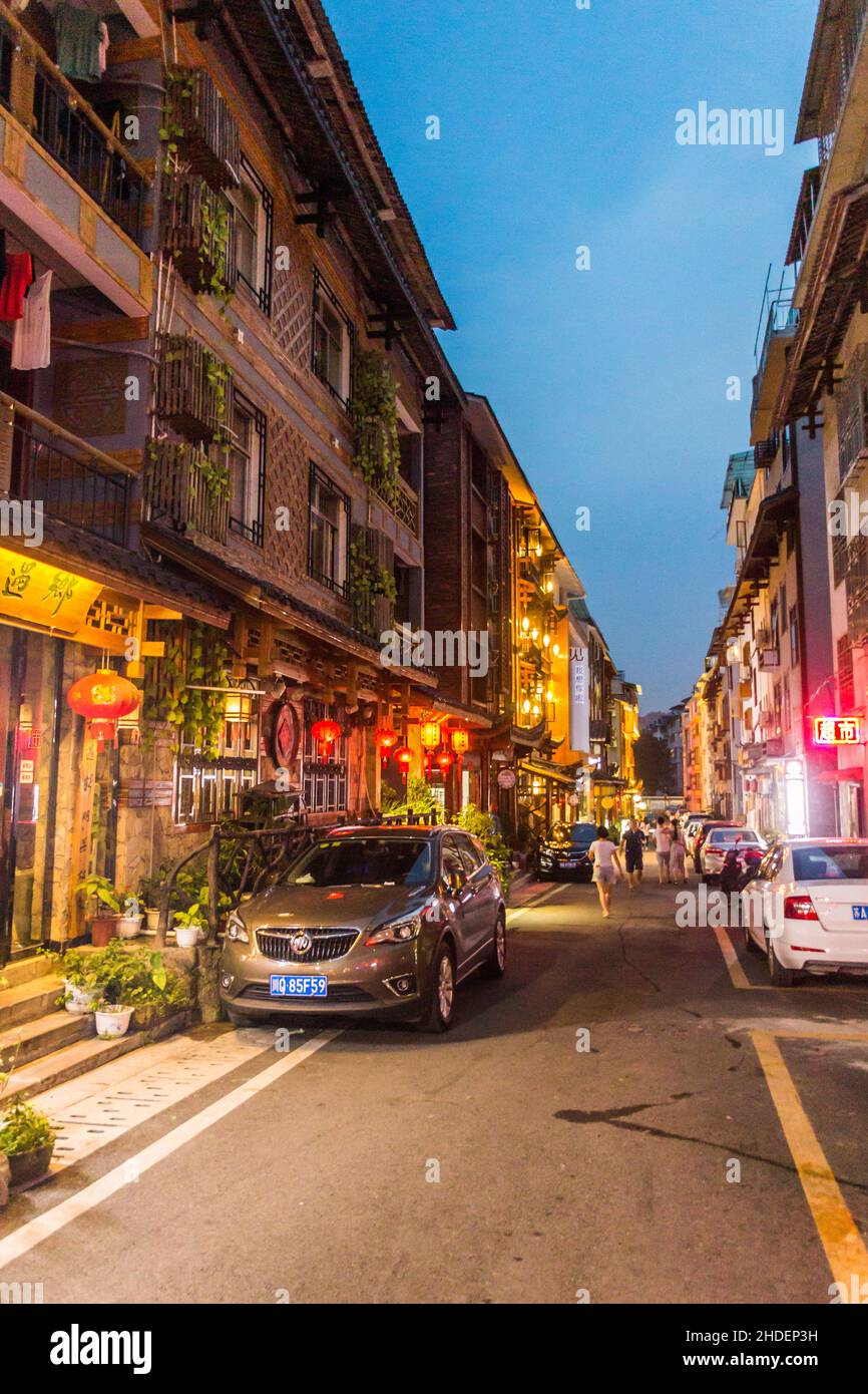 WULINGYUAN, CHINA - AUGUST 10, 2018: Evening view of a street in ...