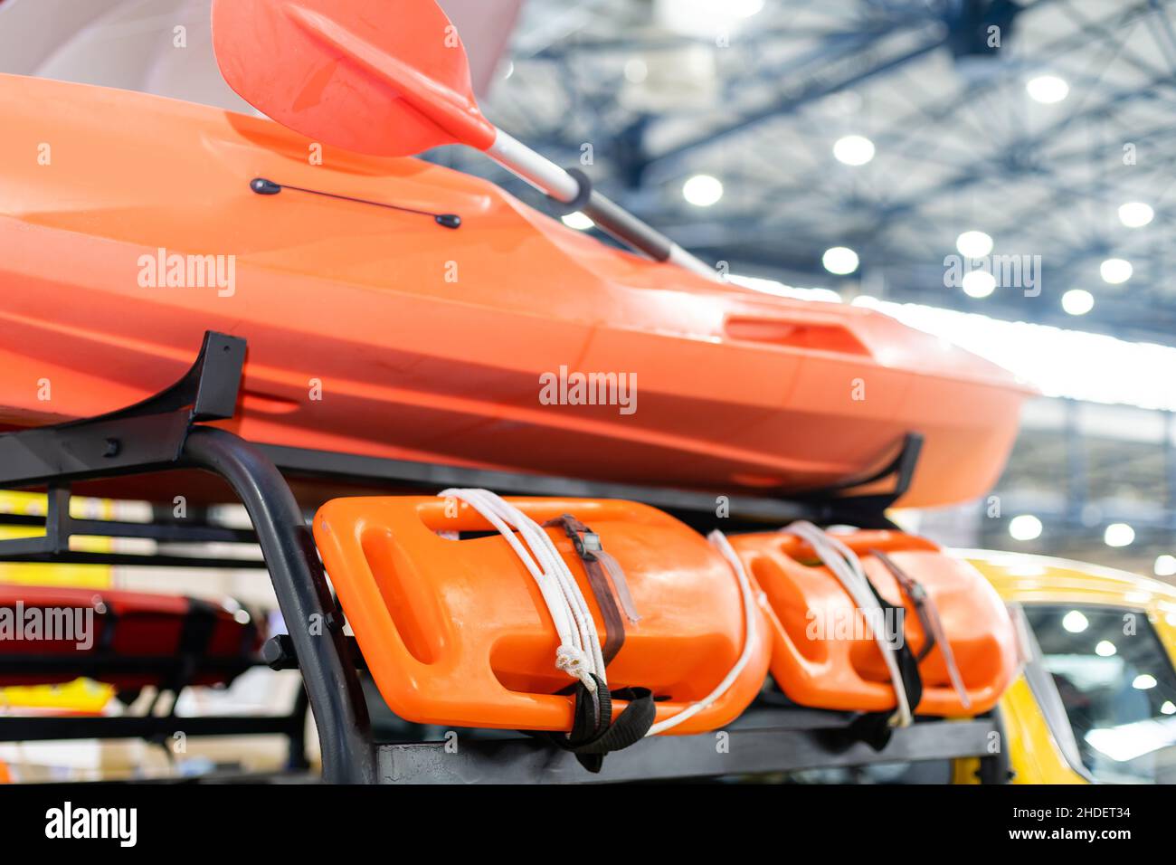 Orange lifeboat on display, paddle Stock Photo - Alamy