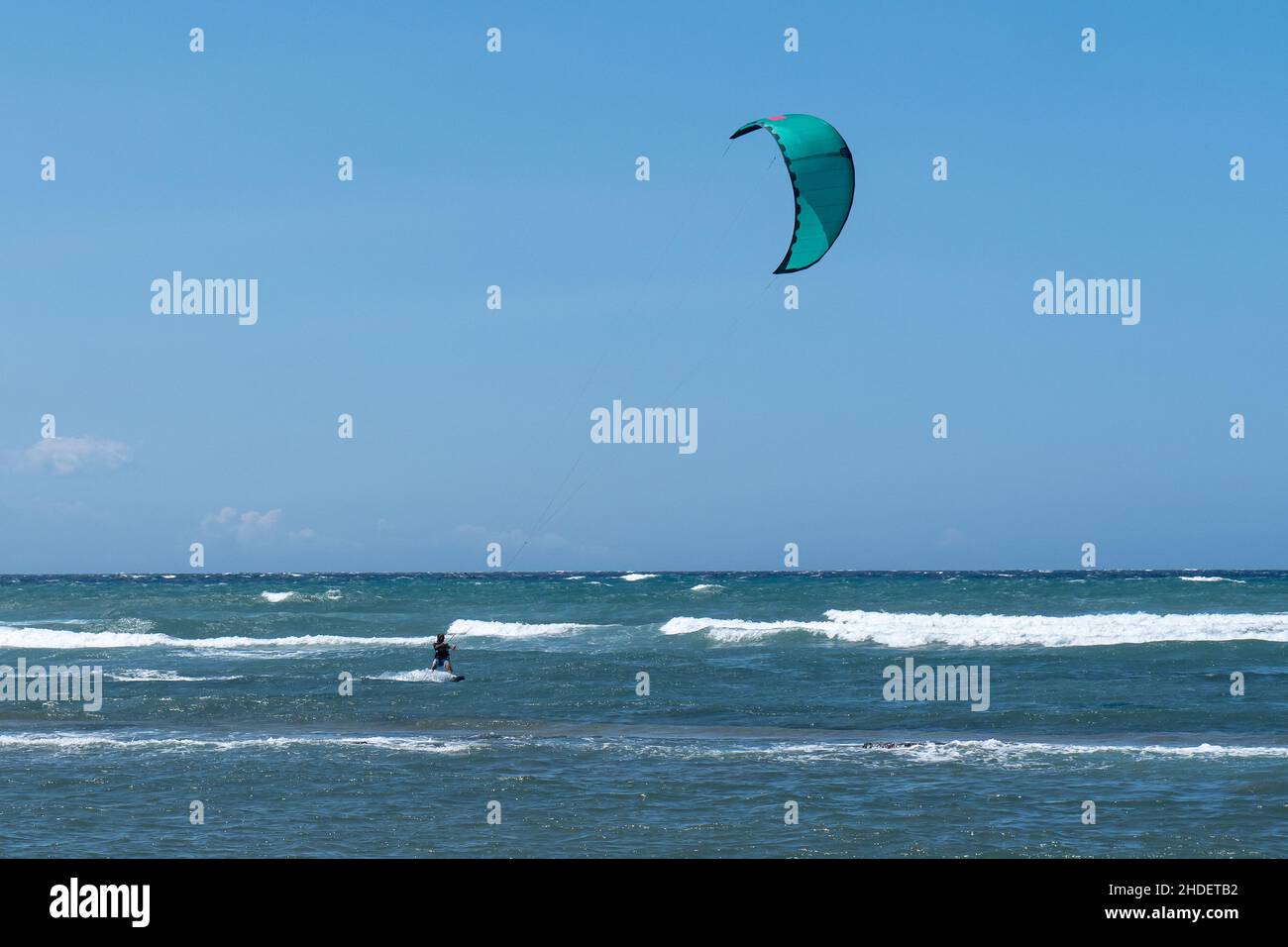 Kitesurfing During a Windy Day with a Very Rough Sea Stock Photo - Alamy