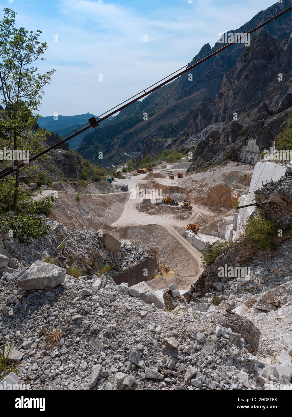 View of the Carrara Marble Quarries with Excavation Vehicles ready for ...