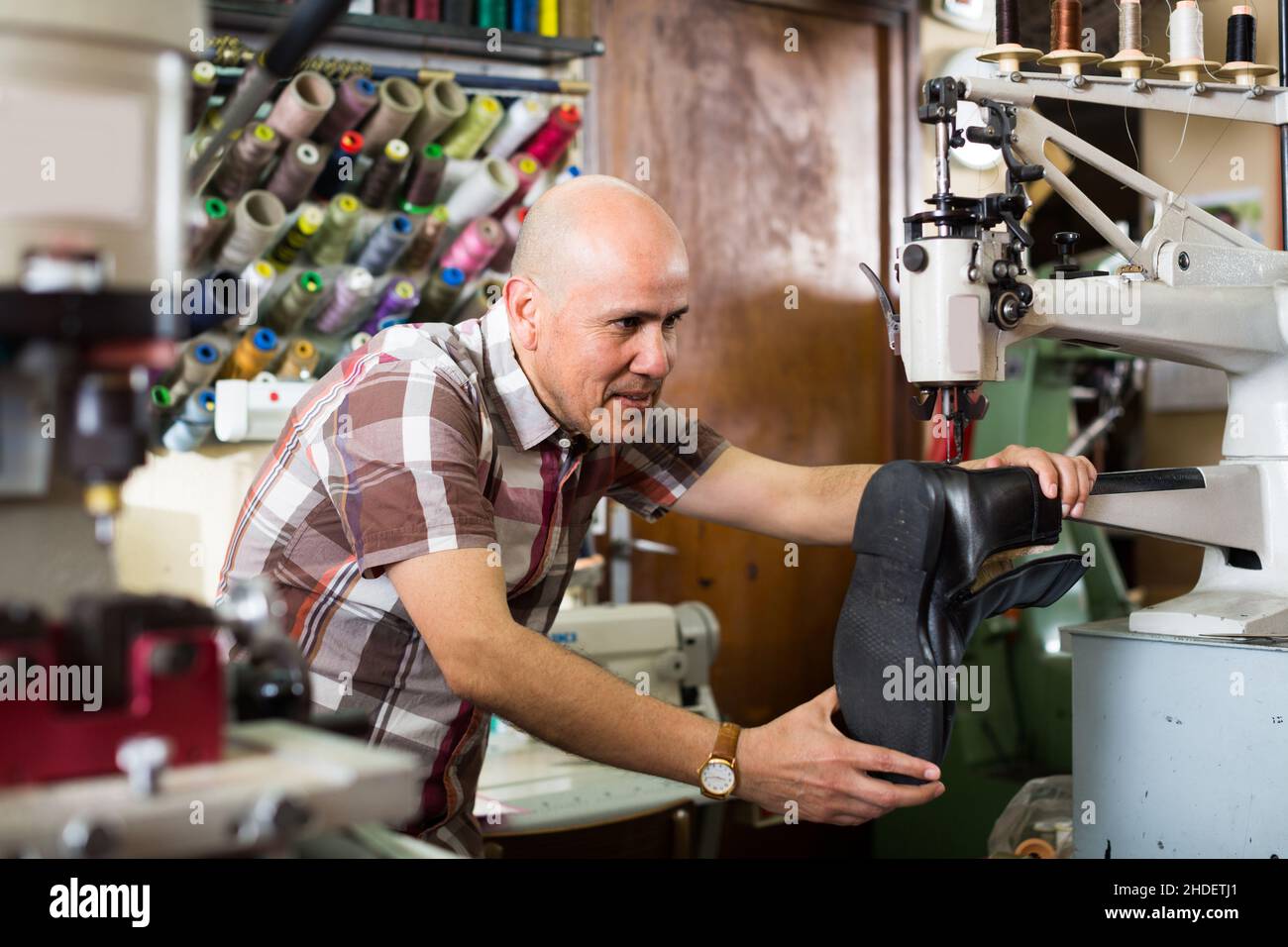 Machine stitching boots hi-res stock photography and images - Alamy