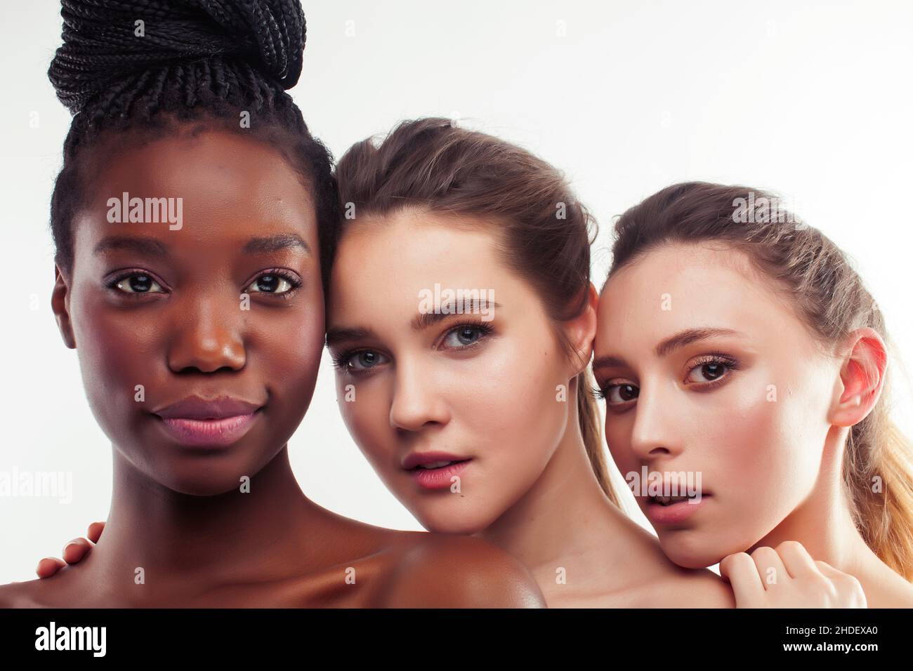three different nation woman: african-american, caucasian together ...