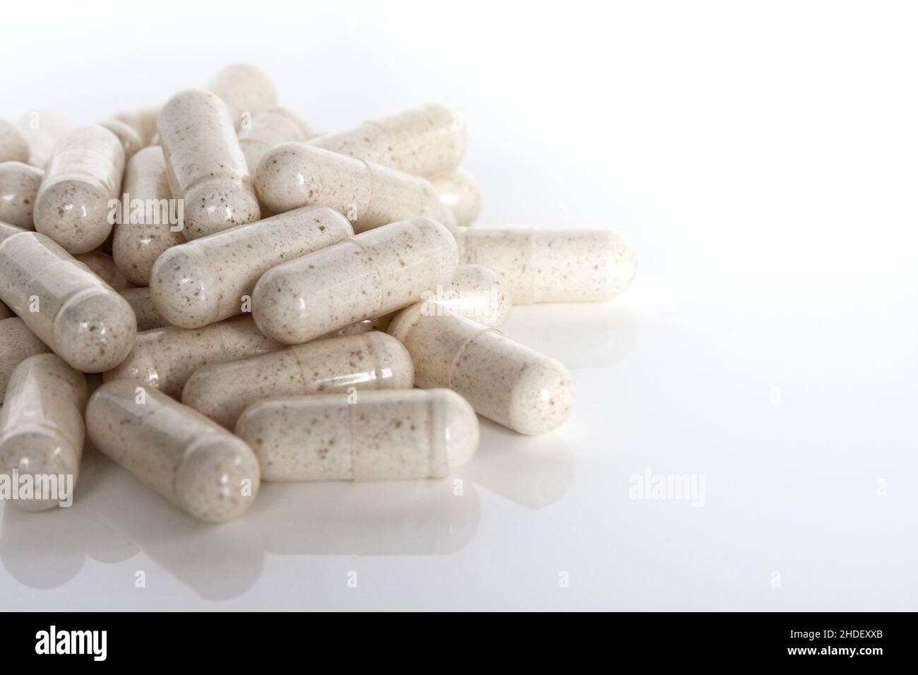 Front view of white multivitamin supplements isolated on white ...