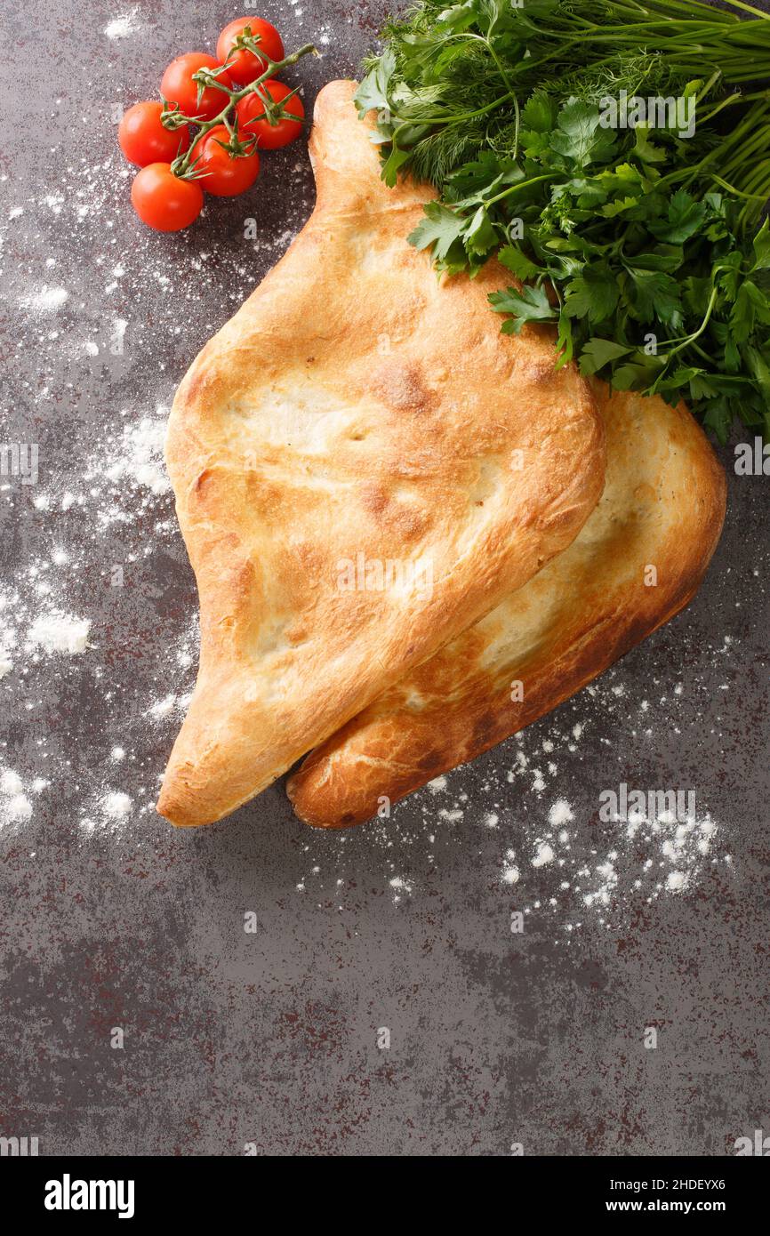 Shotis puri or shoti is a Georgian bread made with whole wheat flour ...