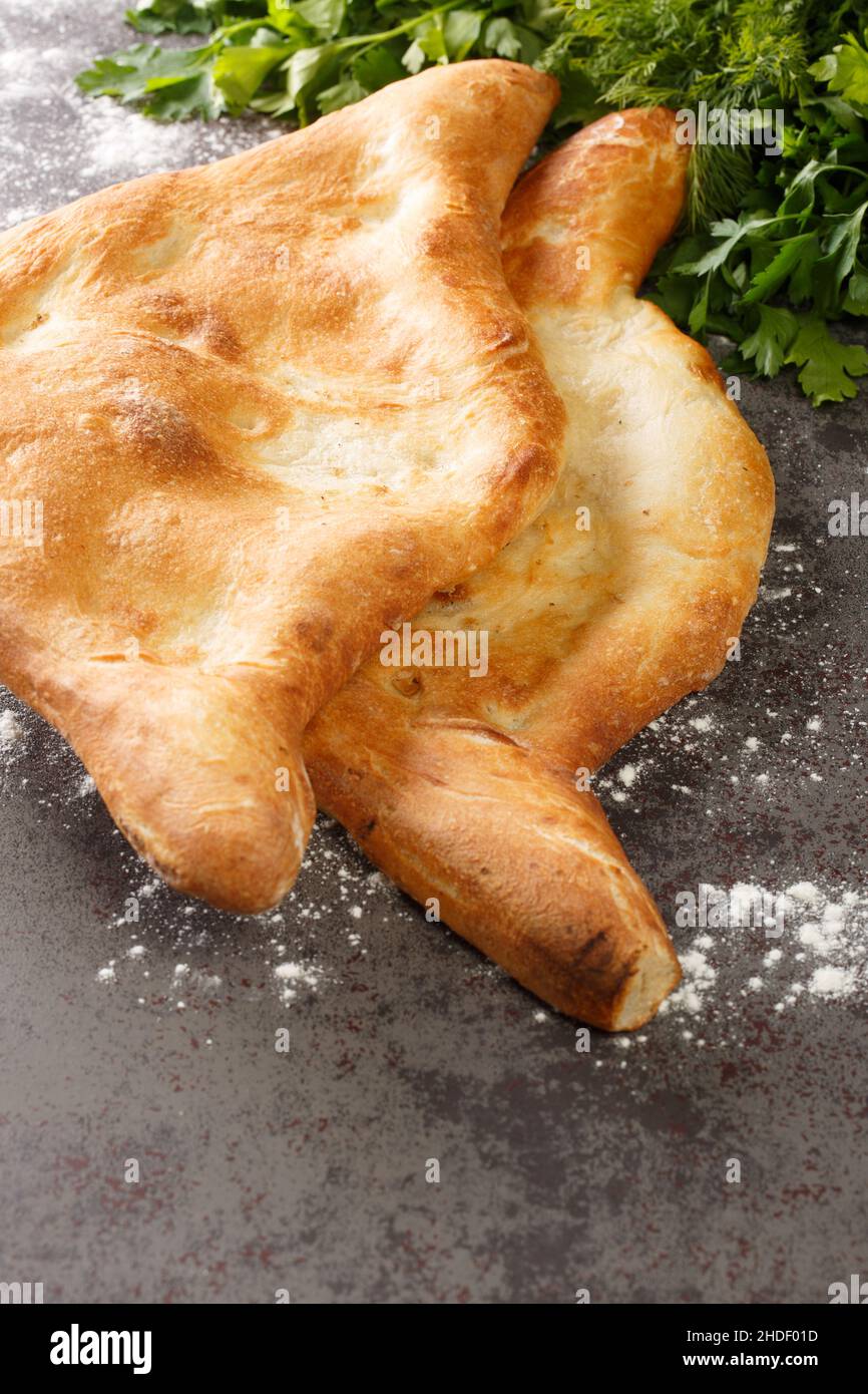 Shotis puri or shoti is a Georgian bread made with whole wheat flour ...