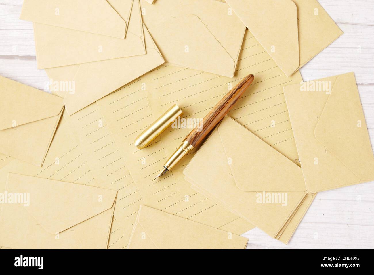 envelope , empty paper and fountain pen on table Stock Photo - Alamy