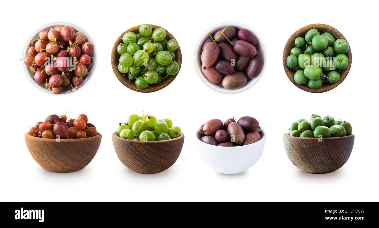 Gooseberries and baby kiwi in a bowl on a white plate. Berries and ...