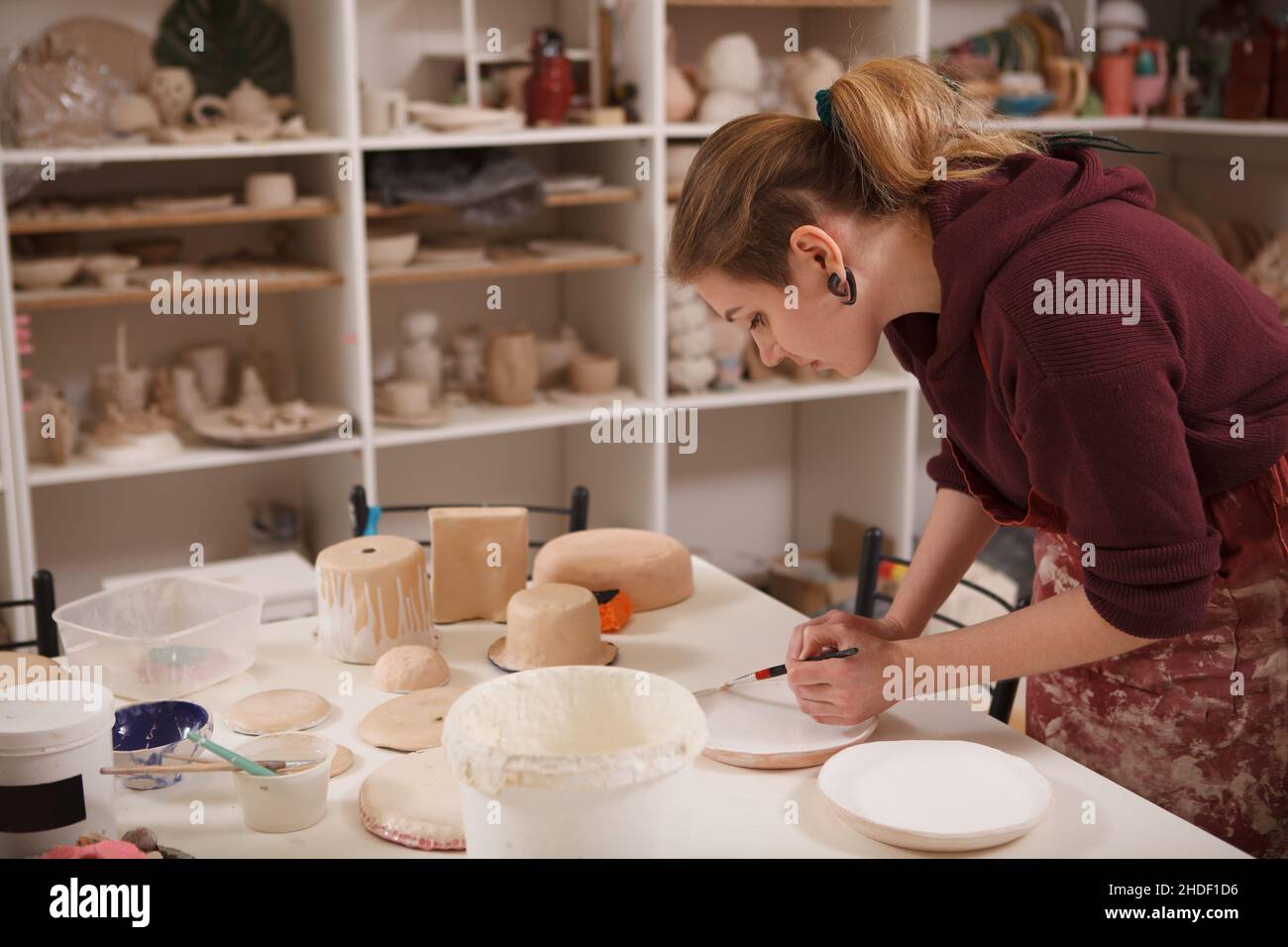 Process decorating ceramics woman hi-res stock photography and images ...