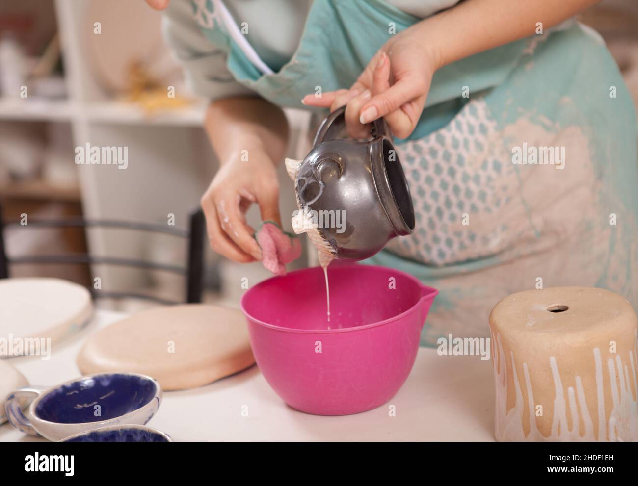Pottery glazing process hi-res stock photography and images - Alamy