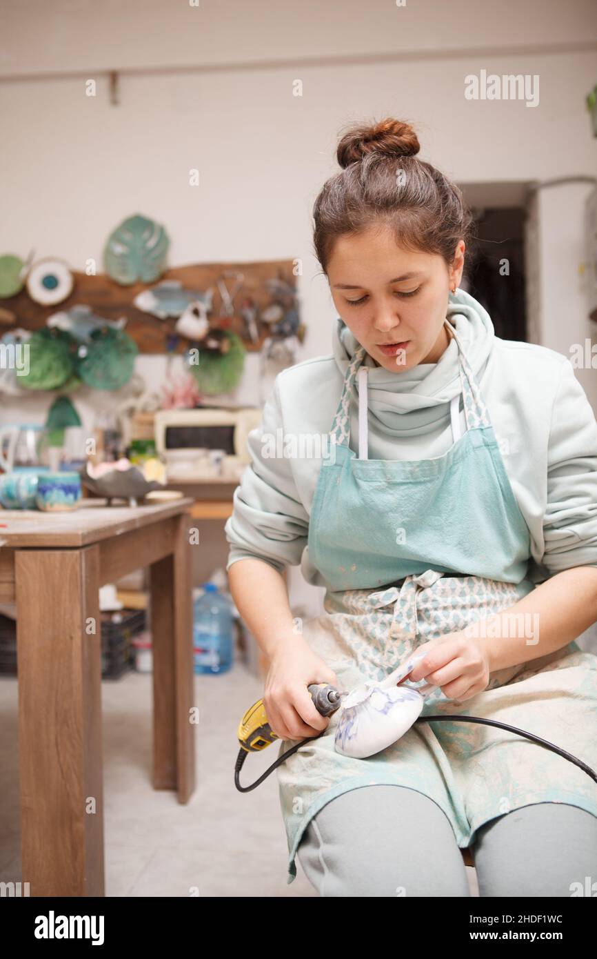 Vertical manufacturing handicraft pottery hi-res stock photography and ...