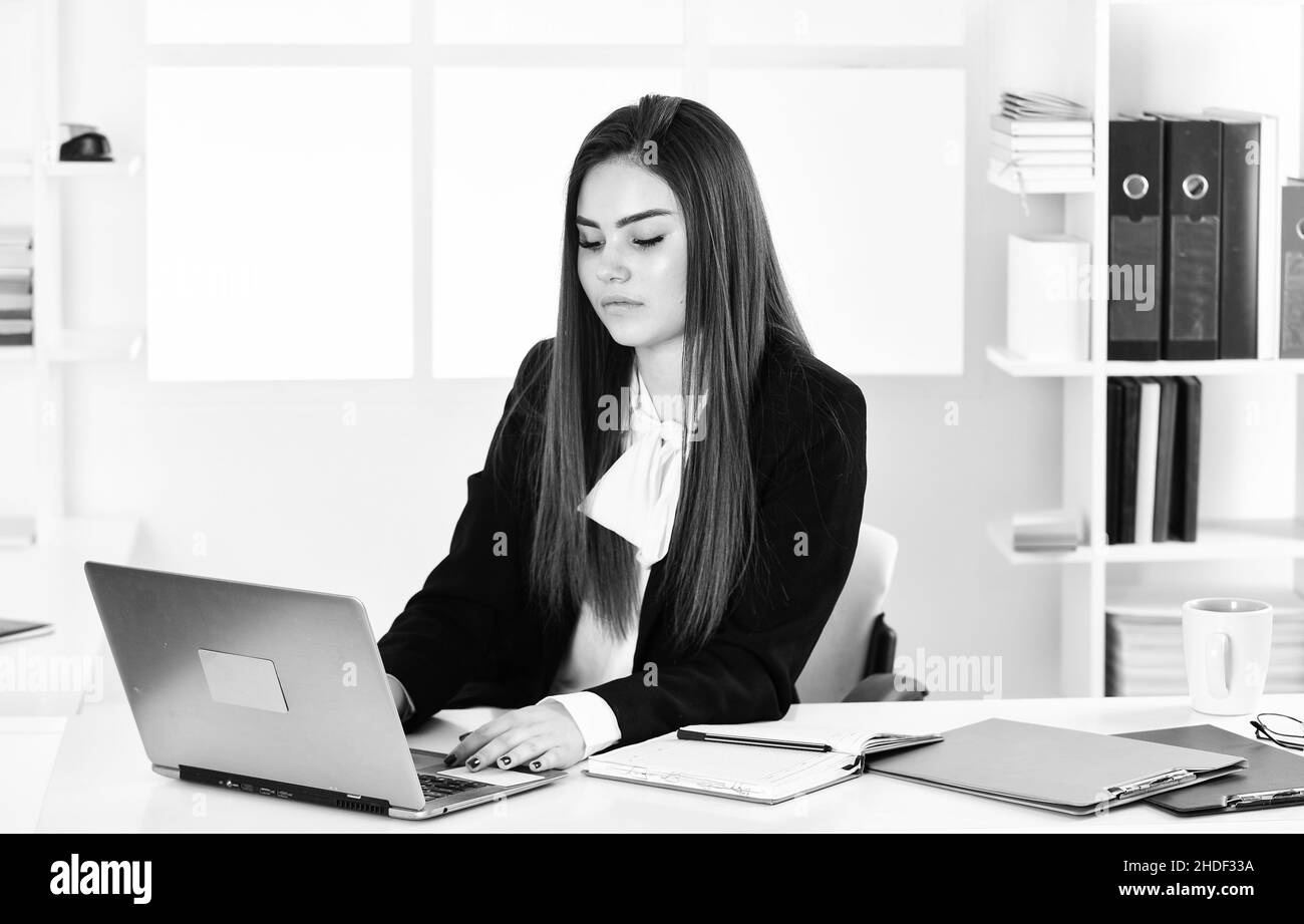 Online banking. Pretty woman notary at work laptop. Bank worker ...