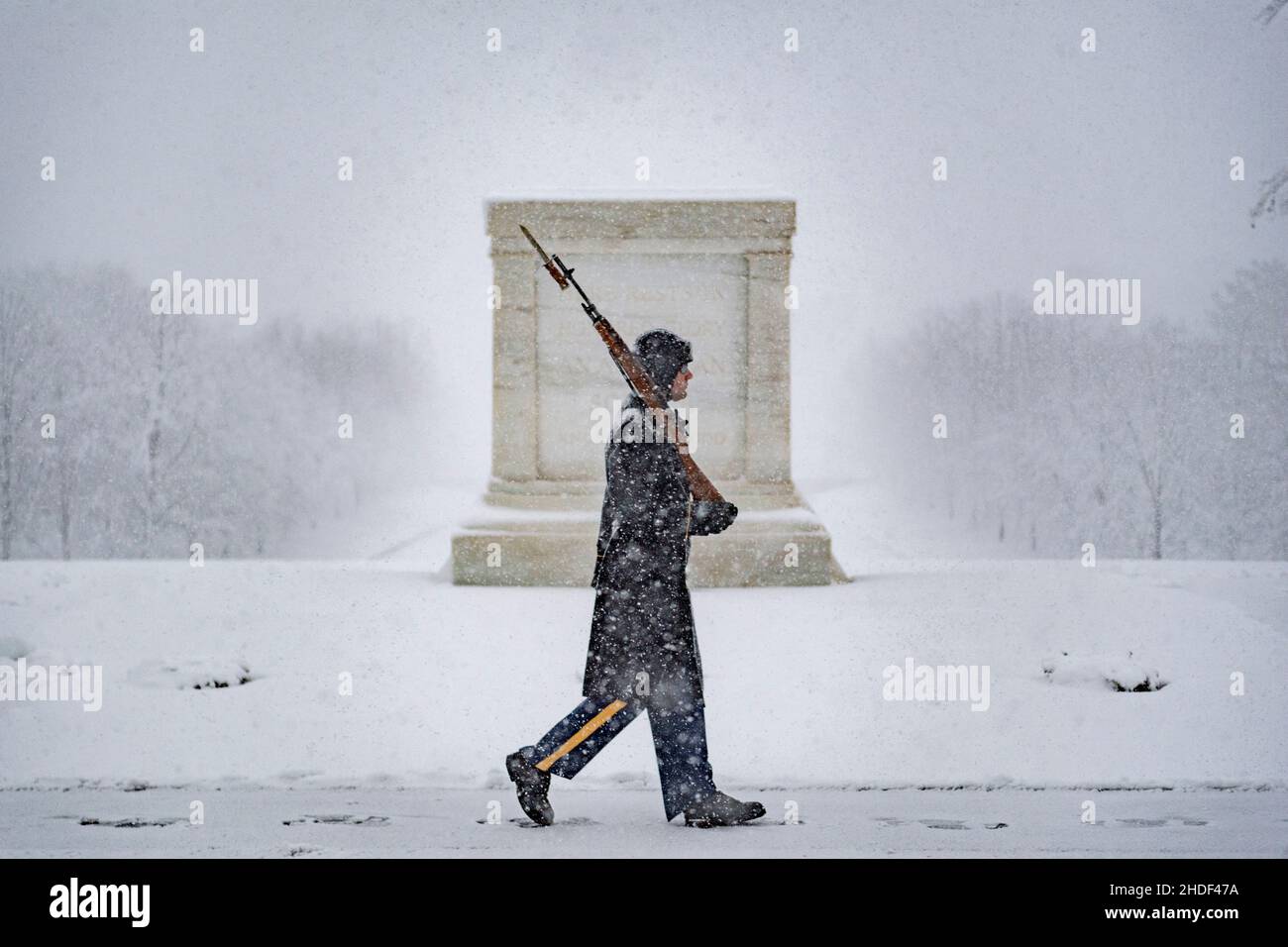 A tomb guard from the 3d U.S. Infantry Regiment (The Old Guard) walks ...