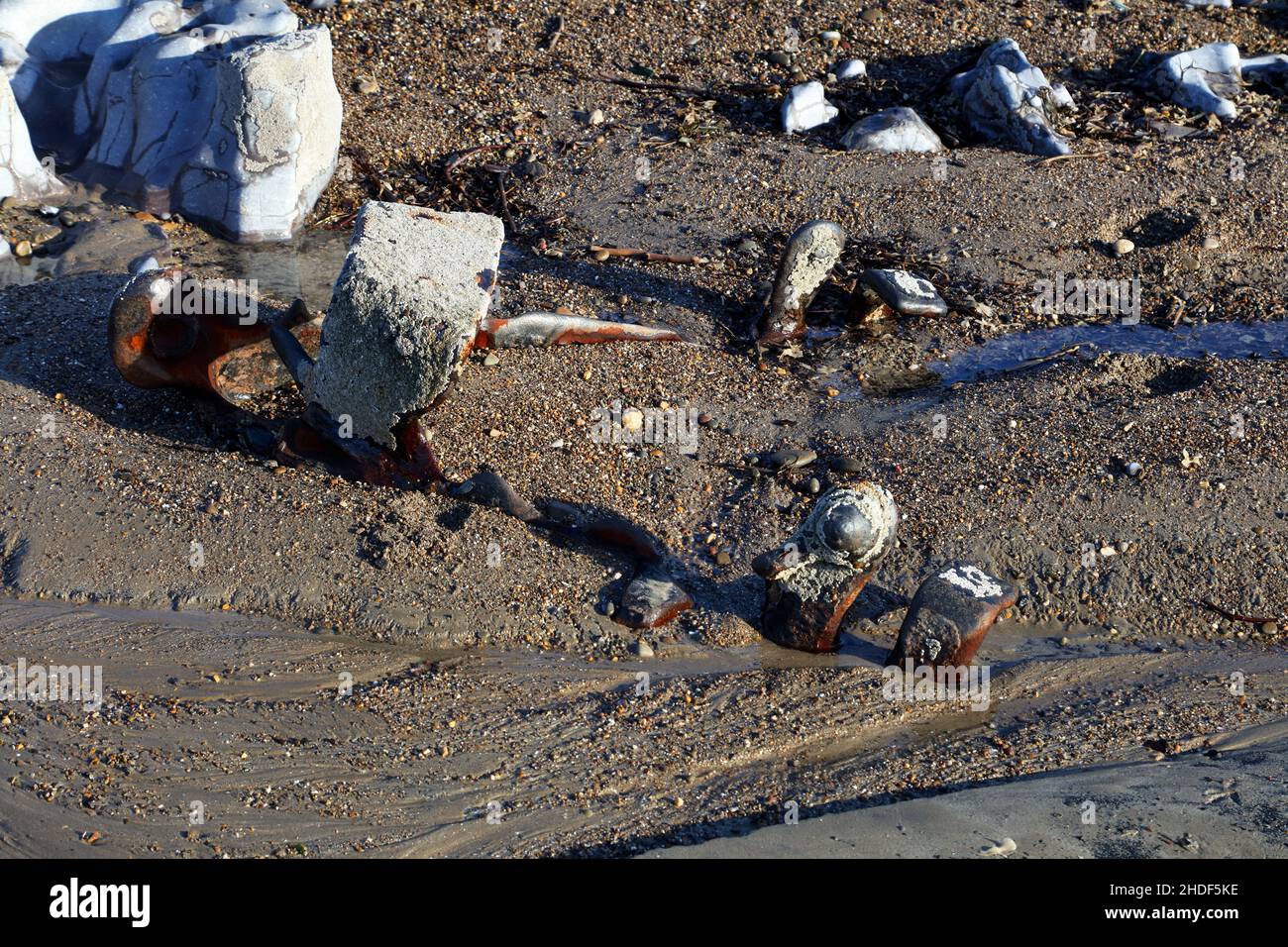 The rusty remains of the front end of a steel framed boat lying at the ...