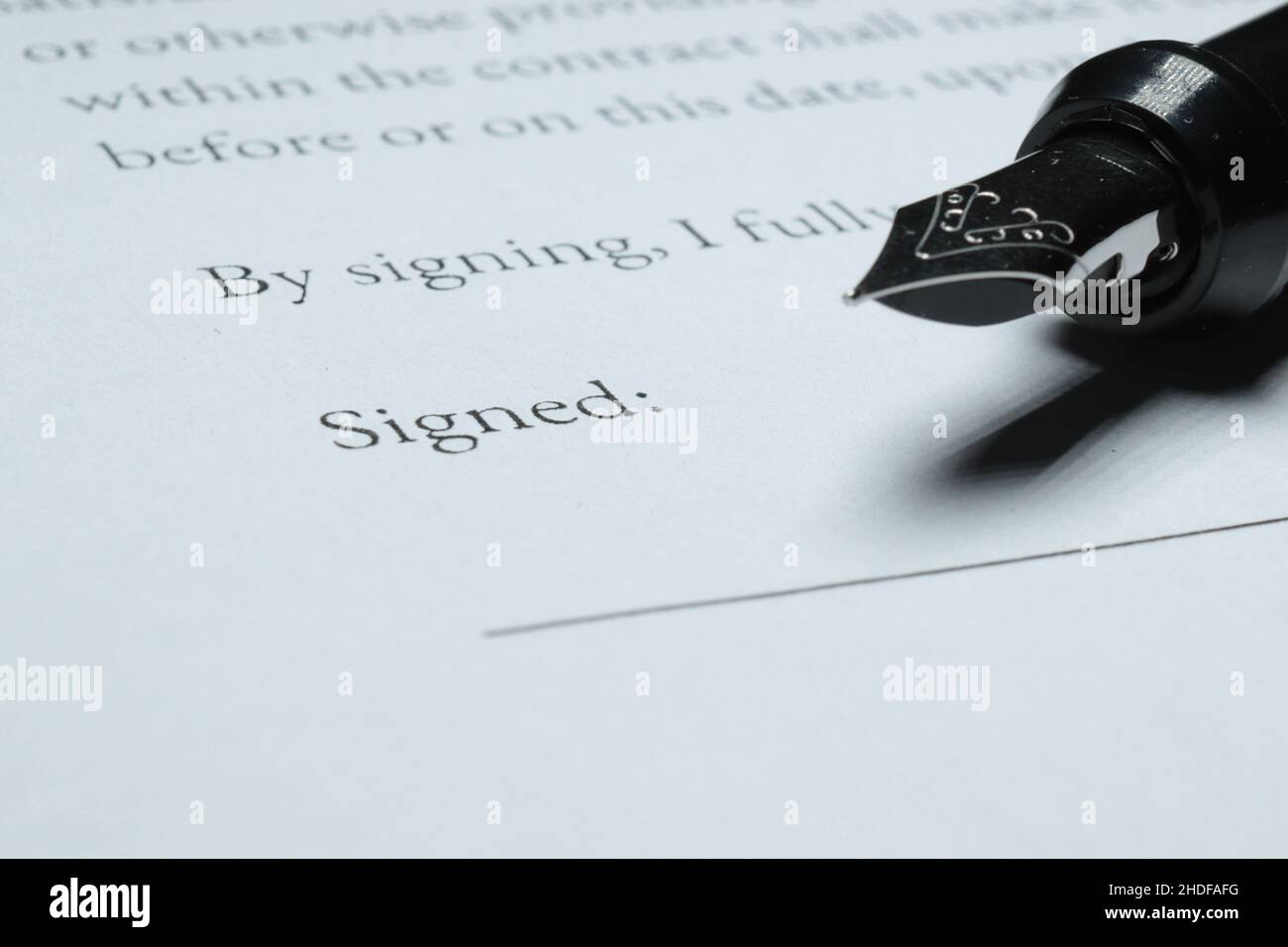Fountain Pen placed next to signature blank Stock Photo - Alamy