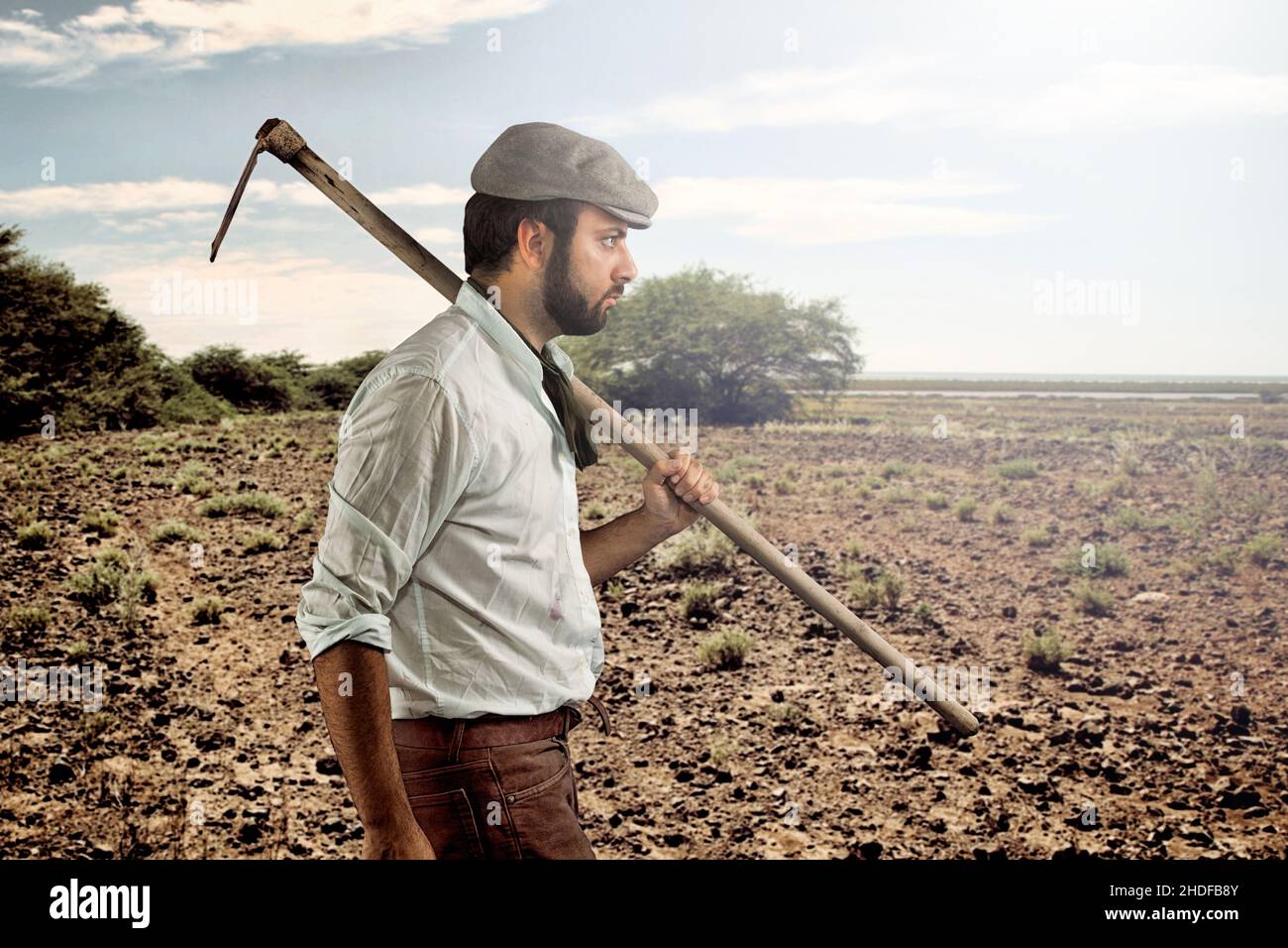 Workers Hoeing A Garden