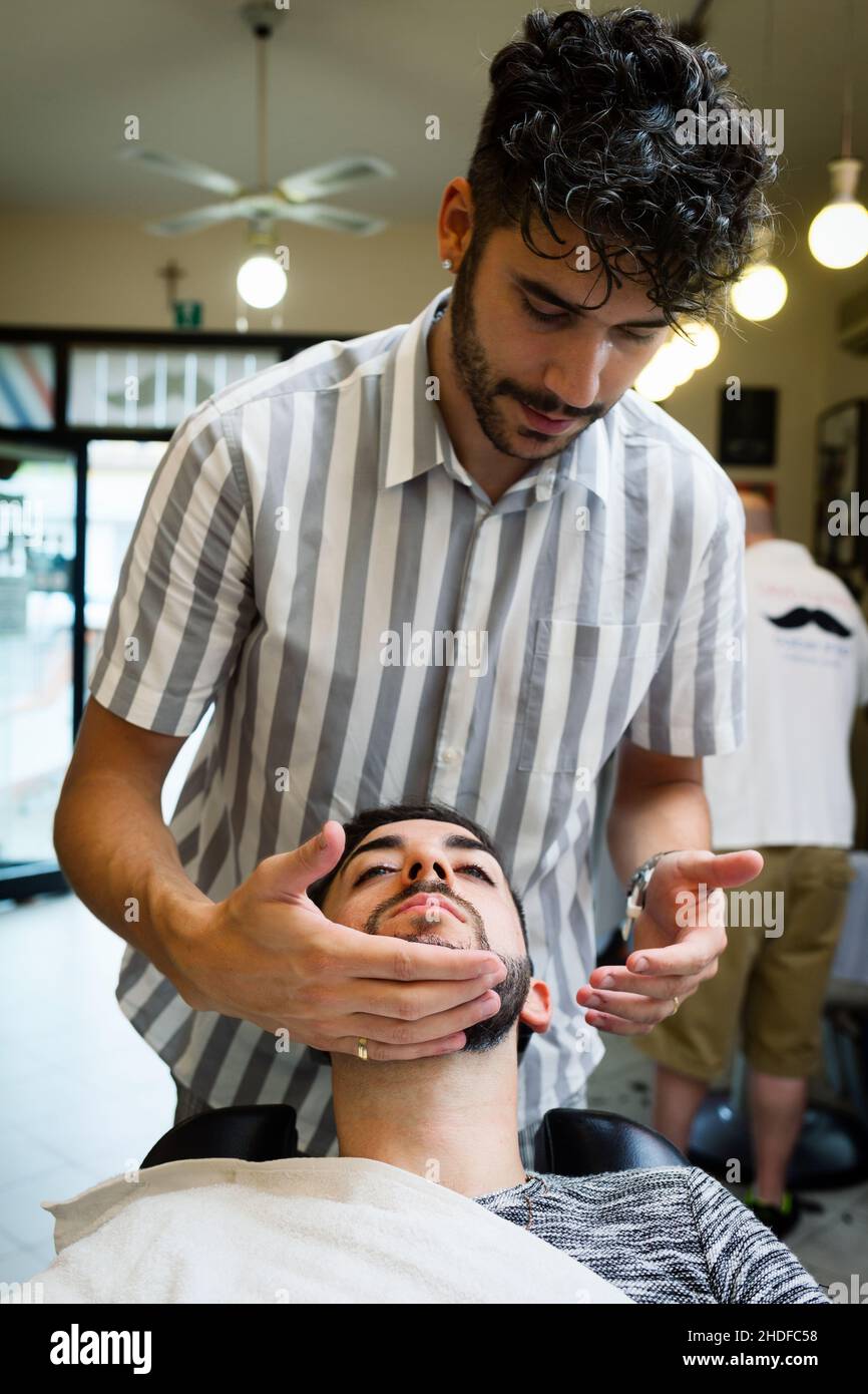 applying, barber, beard care, barbers, beard cares Stock Photo - Alamy