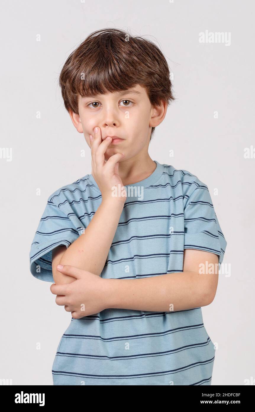 Boy in deep thought hi-res stock photography and images - Alamy