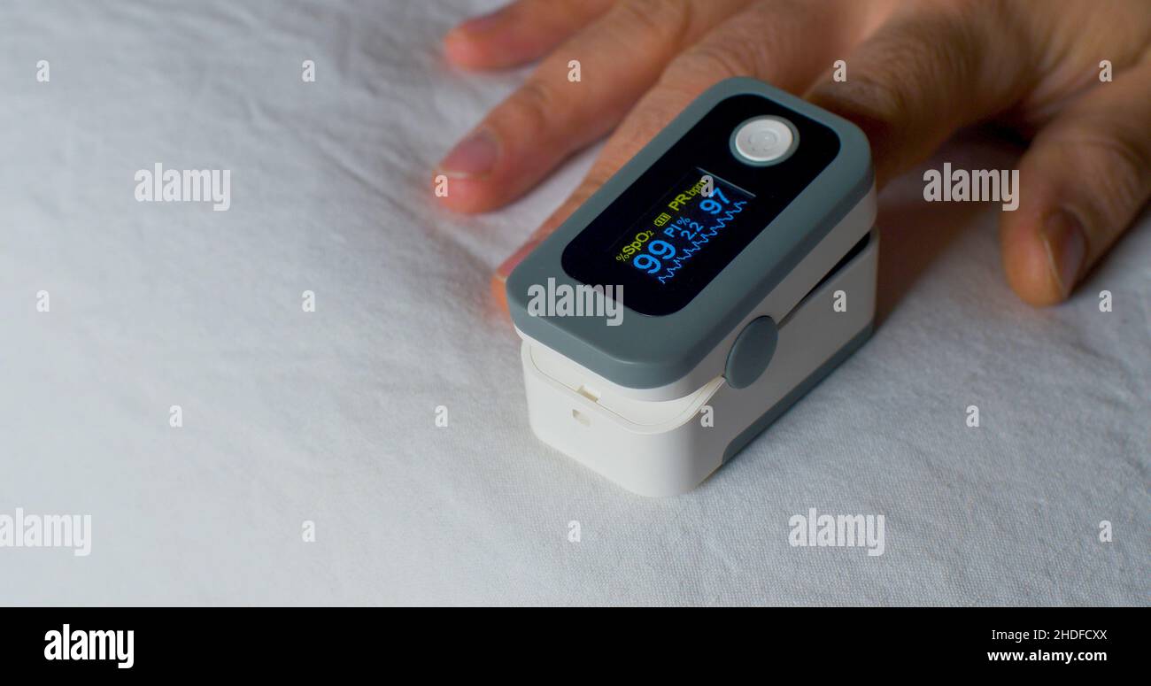 Pulse oximetry measurements hi-res stock photography and images - Alamy