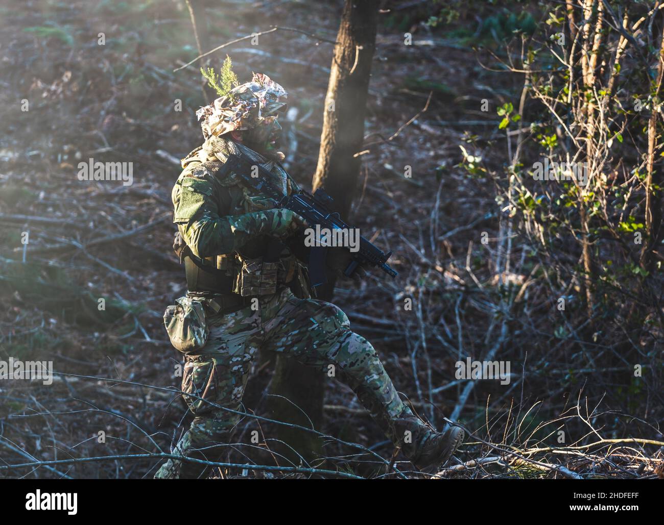Guy running with gun hi-res stock photography and images - Alamy