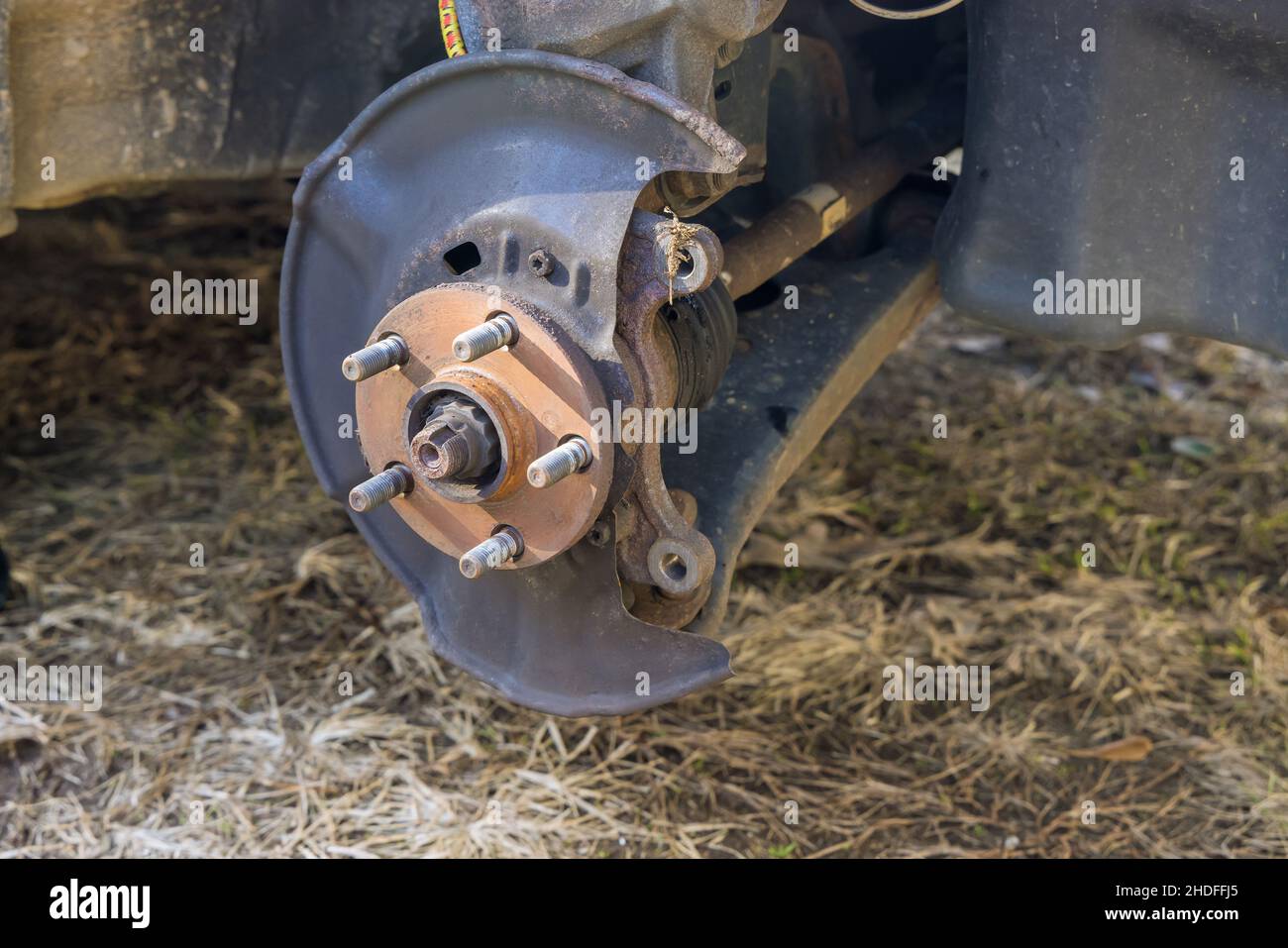 Brake disc and used brake pads on brake assembly service Stock Photo ...