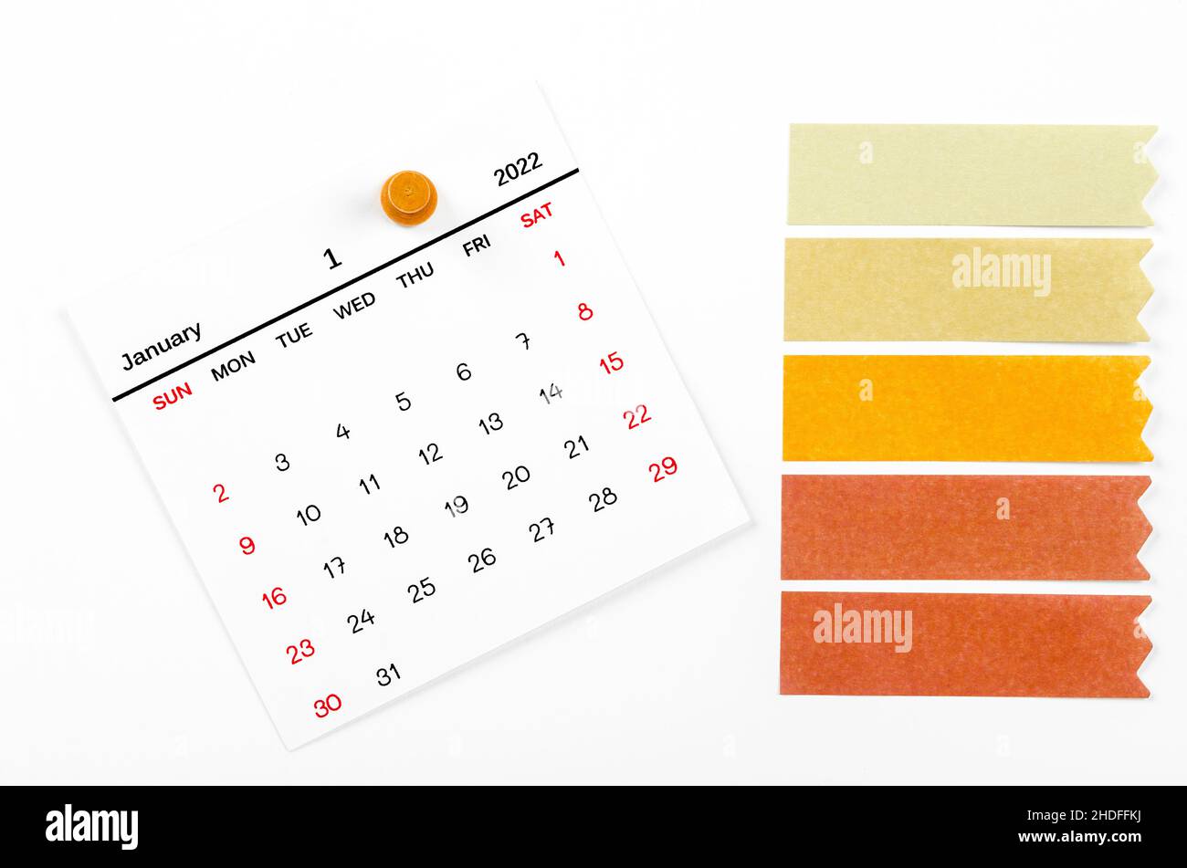 January calendar with wooden push pin and blank adhesive note paper on ...