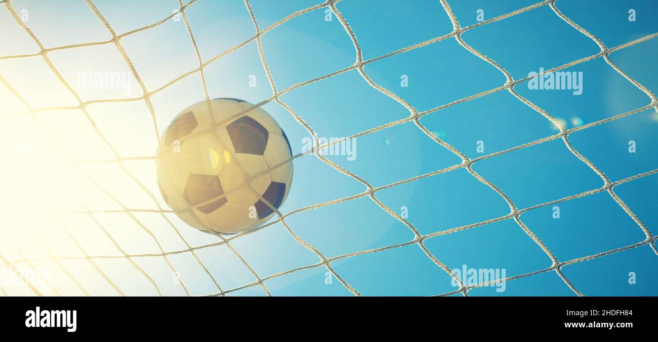 Soccer ball into net hi-res stock photography and images - Alamy