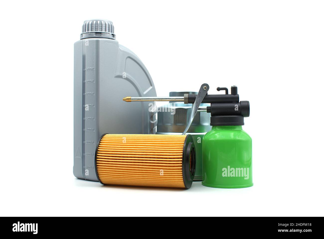 Motor oil, hand oiler and oil filters isolated on a white background ...