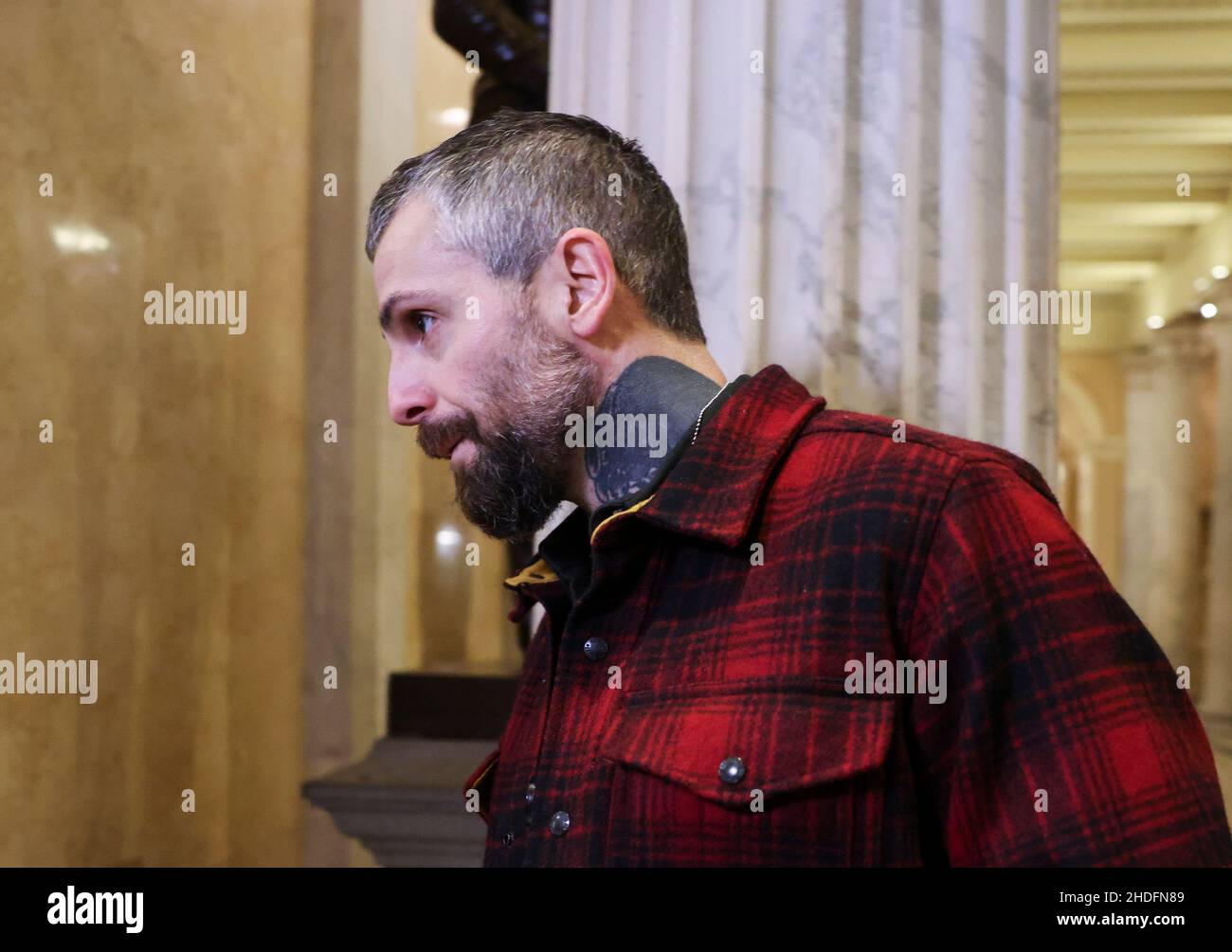 DC Metropolitan Police Department officer Michael Fanone walks in the ...