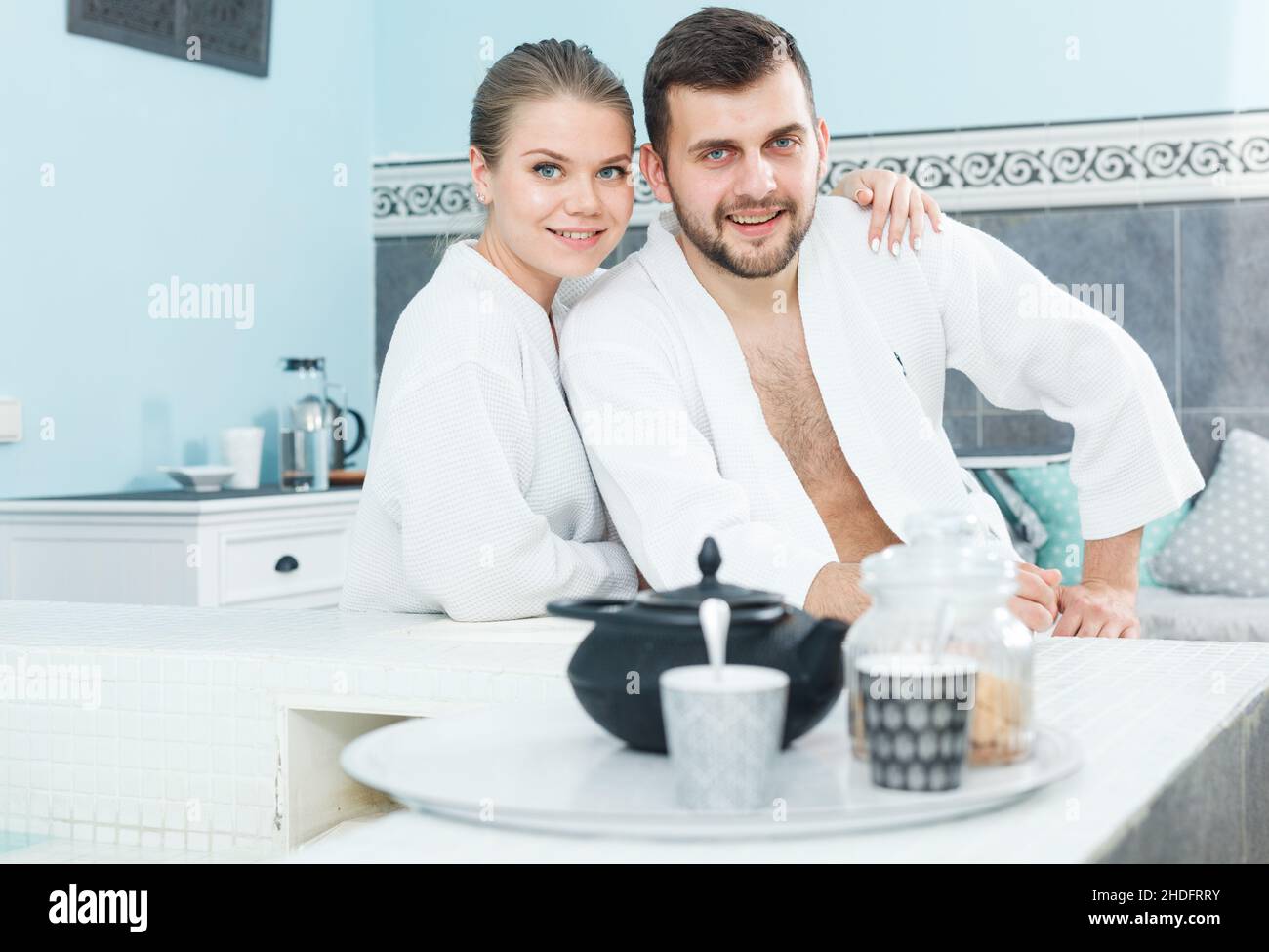 Couple drinking tea after spa Stock Photo - Alamy