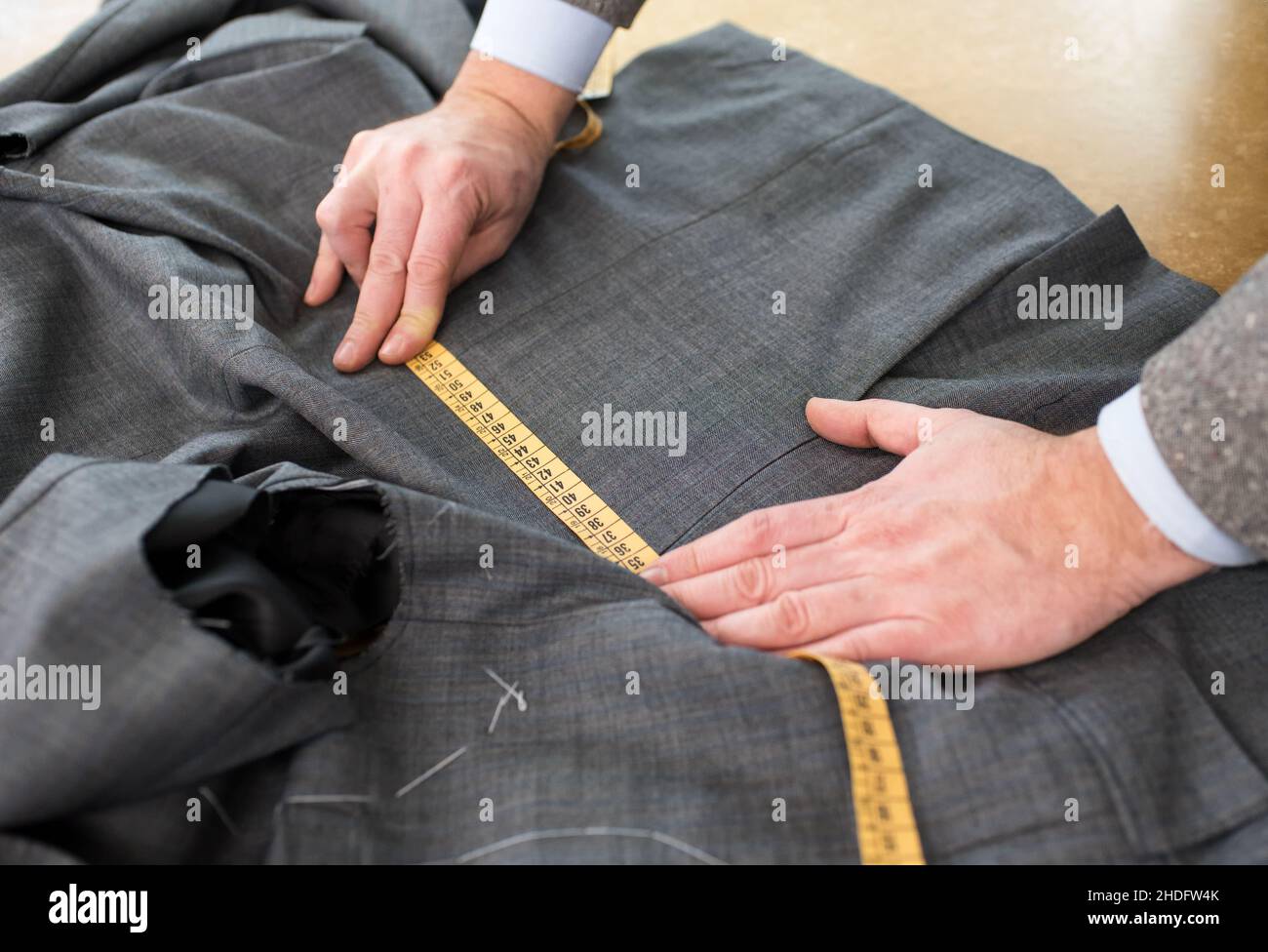 Suits measuring suit hi-res stock photography and images - Alamy