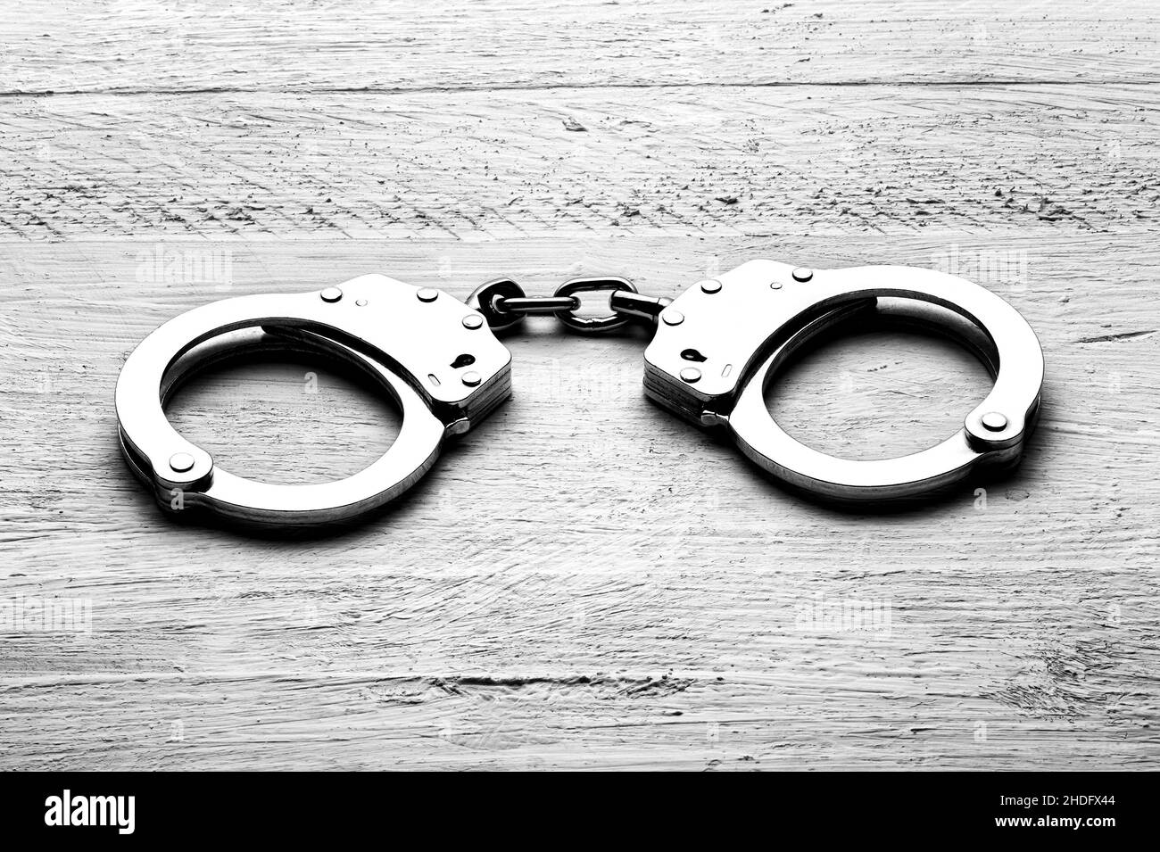 Handcuffs Black and White Stock Photos & Images - Alamy