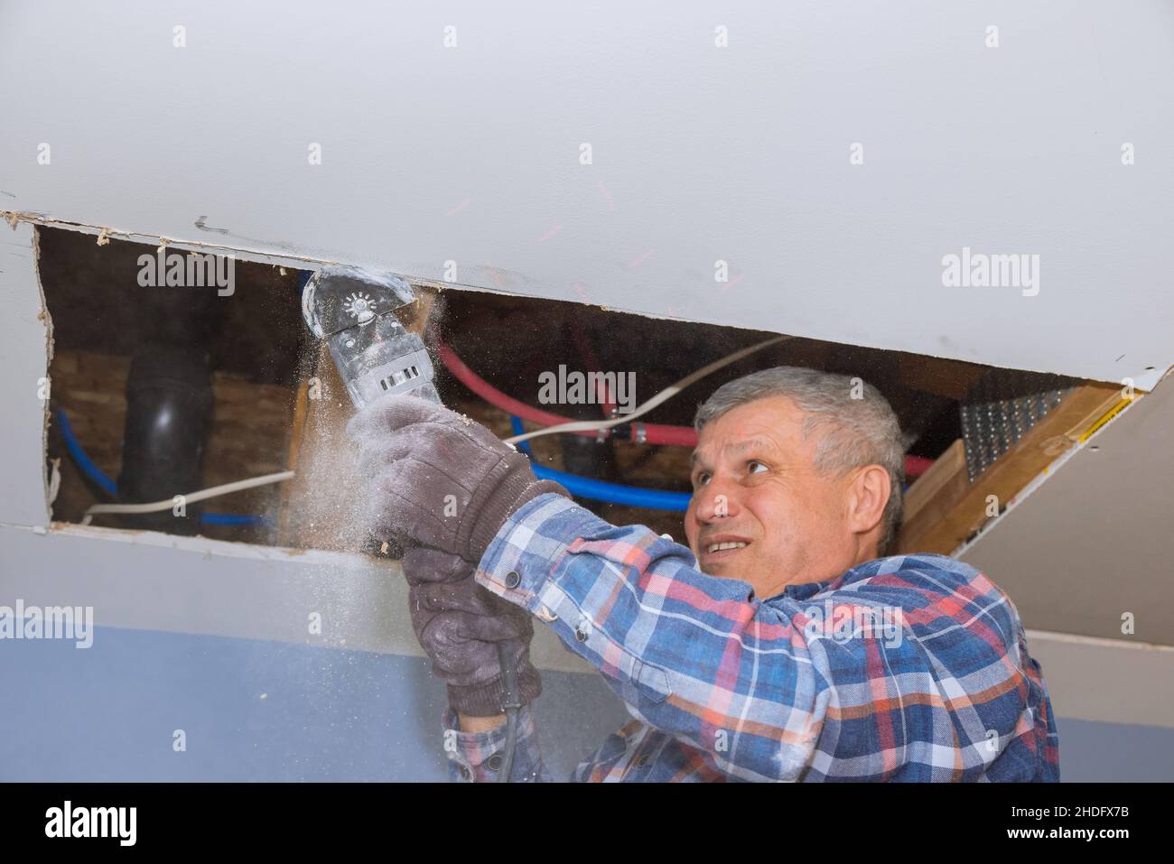 Repair of home on angle hand electric power tools on cutting gypsum ...