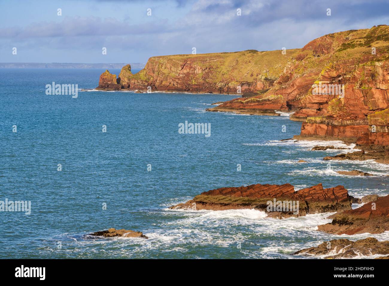 The sedimentary rock layers of the cliffs along the Pembrokeshire Coast ...