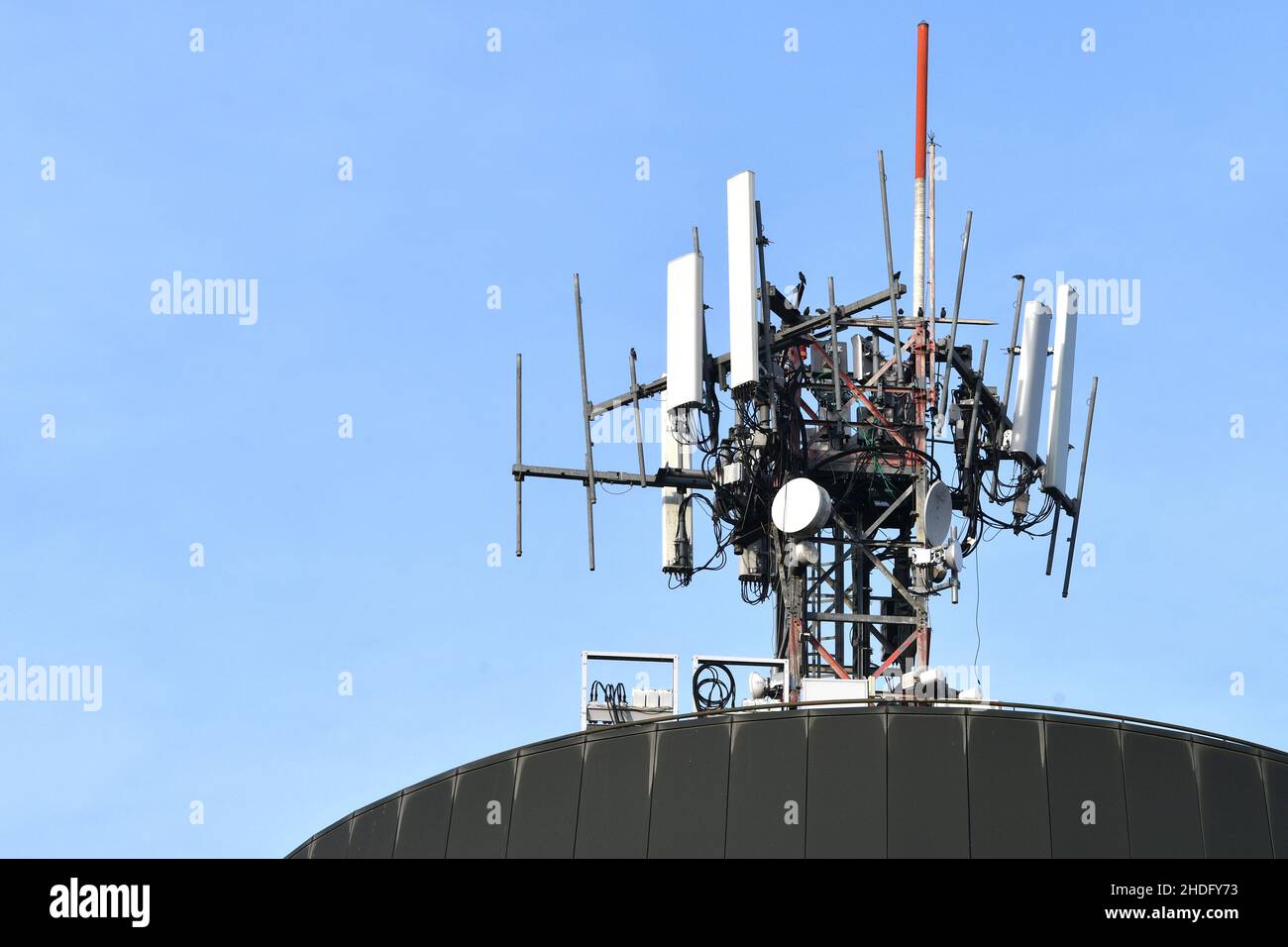 Detail of the telecommunication tower on the roof of a palace with the ...