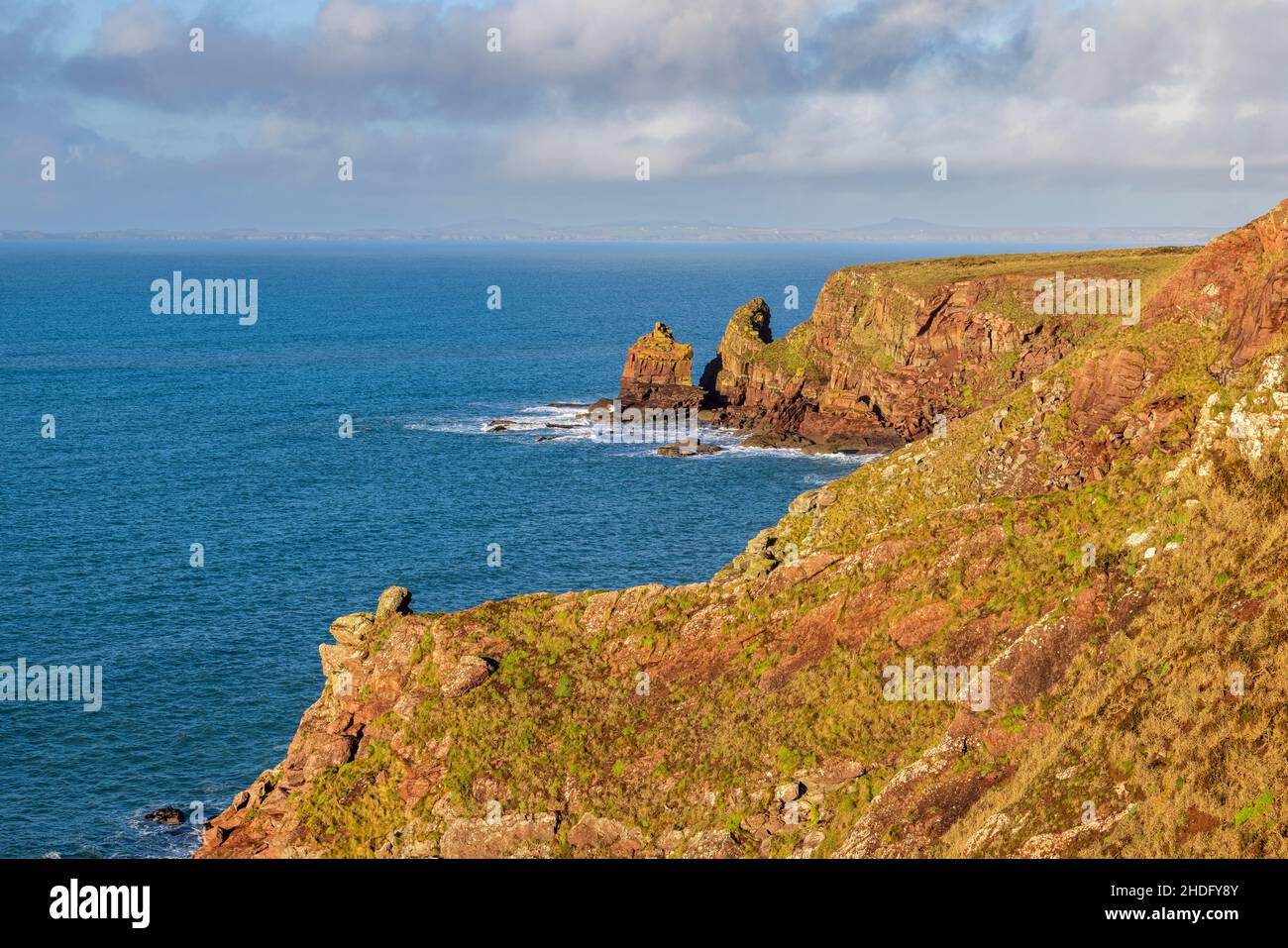 The sedimentary rock layers of the cliffs along the Pembrokeshire Coast ...